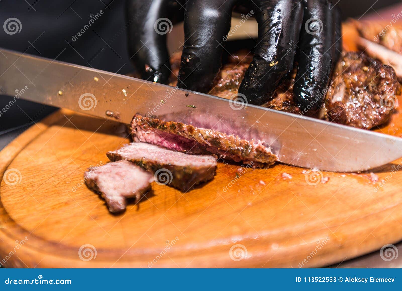 Hands cook cut fried meat stock image. Image of hand - 113522533