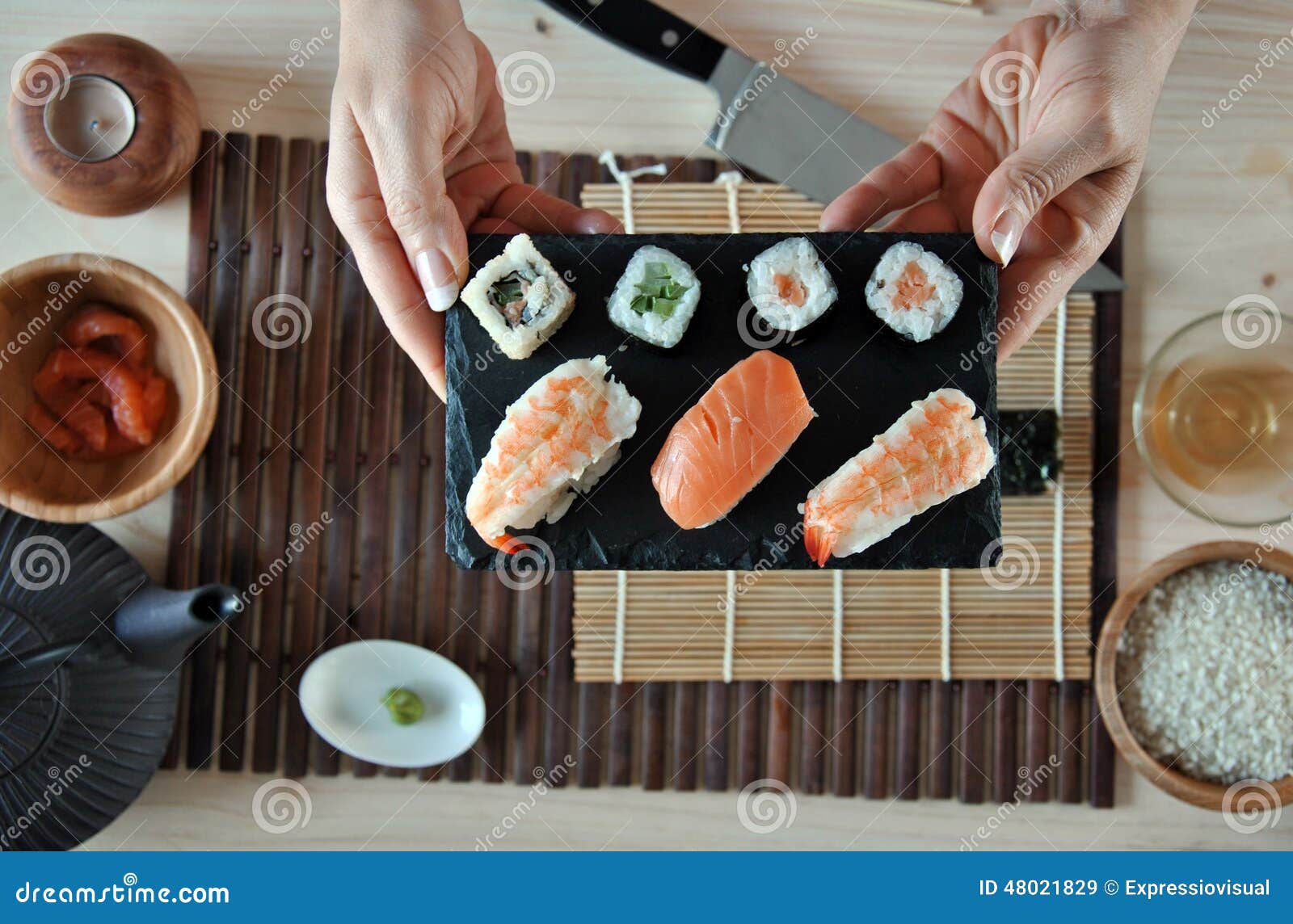 Hands cooking sushi stock image. Image of cuisine, asian - 48021829