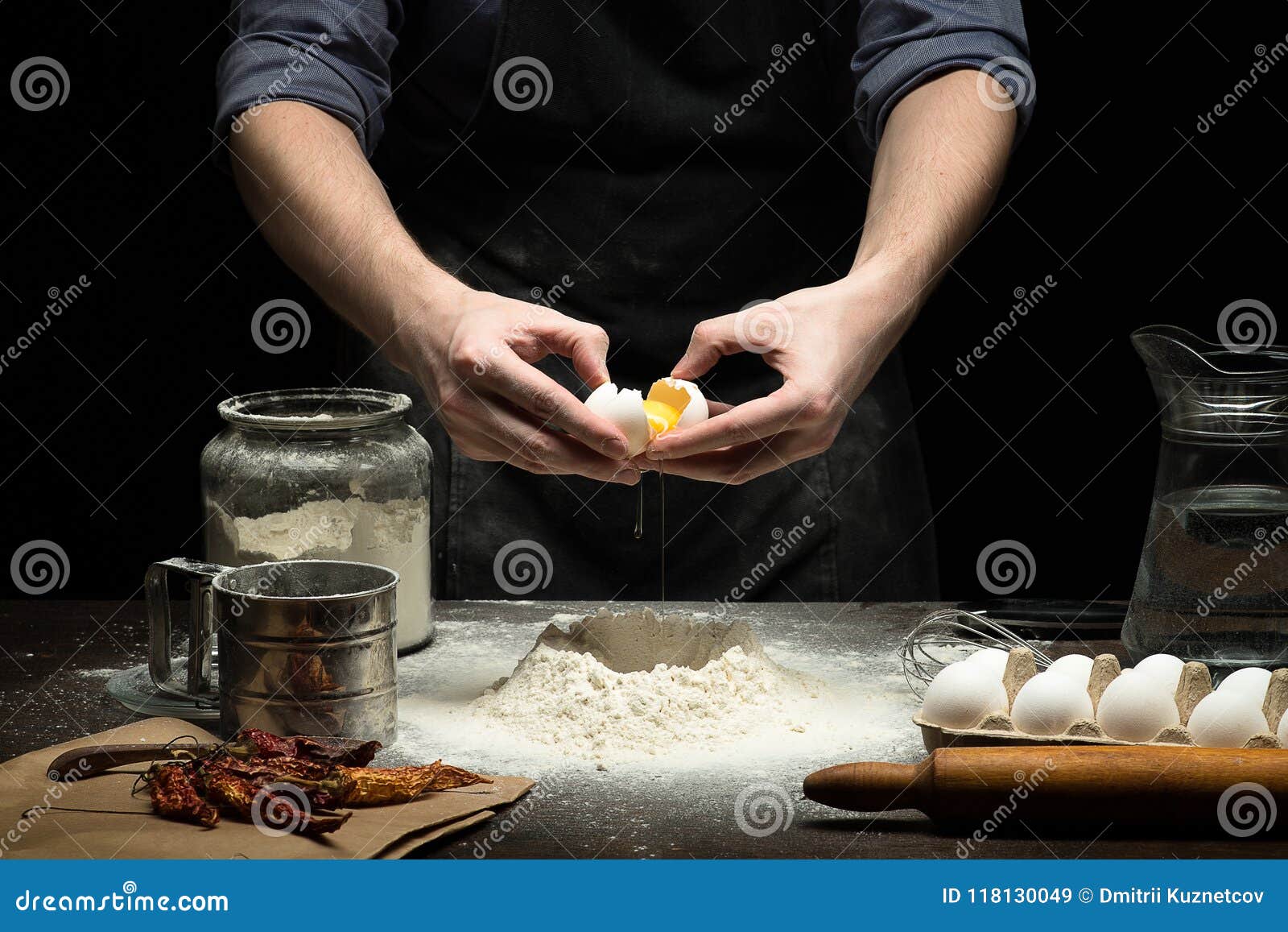 Hands are Cracking an Egg into Flour To Make Dough Stock Image - Image ...