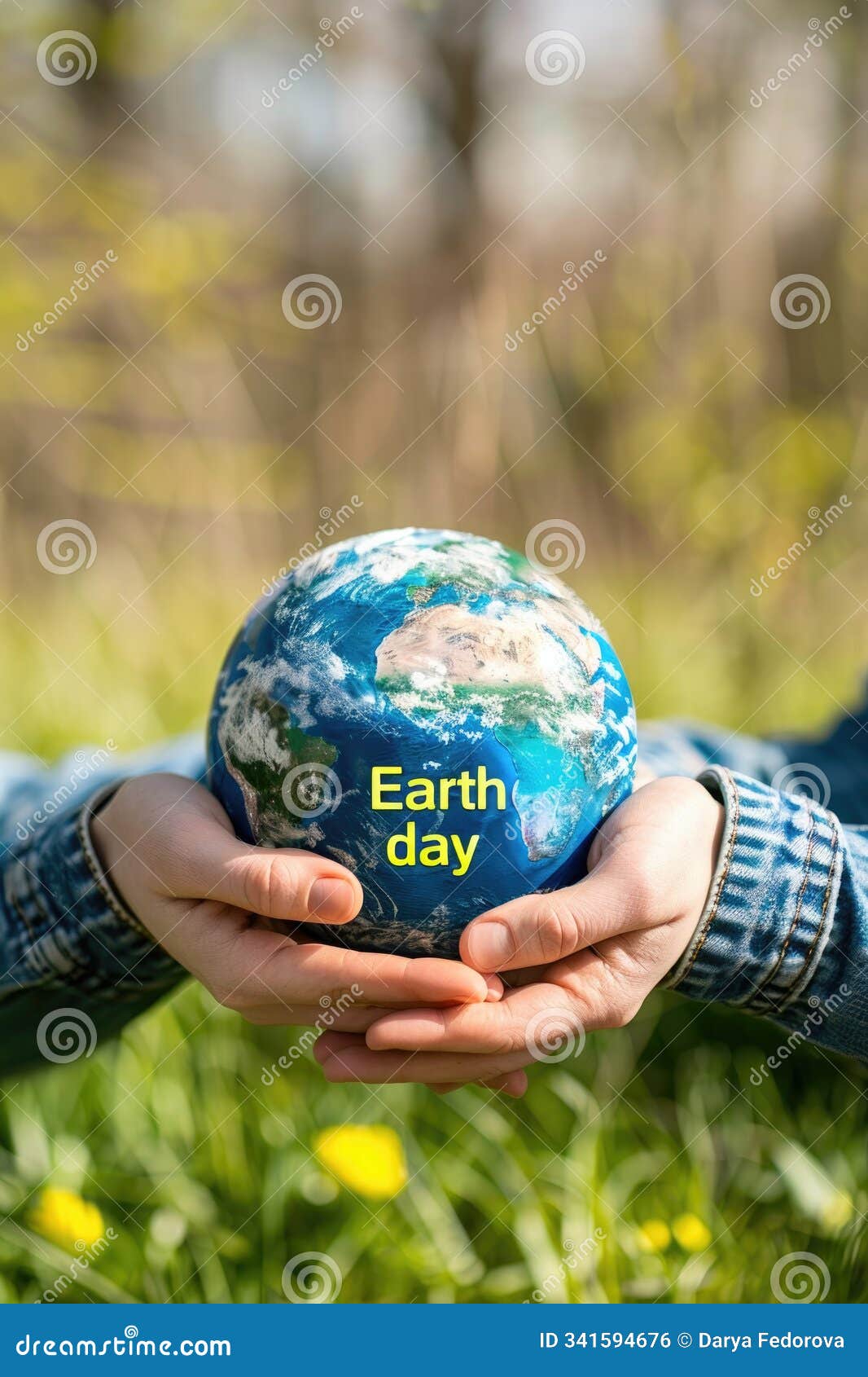 Hands Cradling Earth Globe on Greenery for Earth Day Stock Photo ...