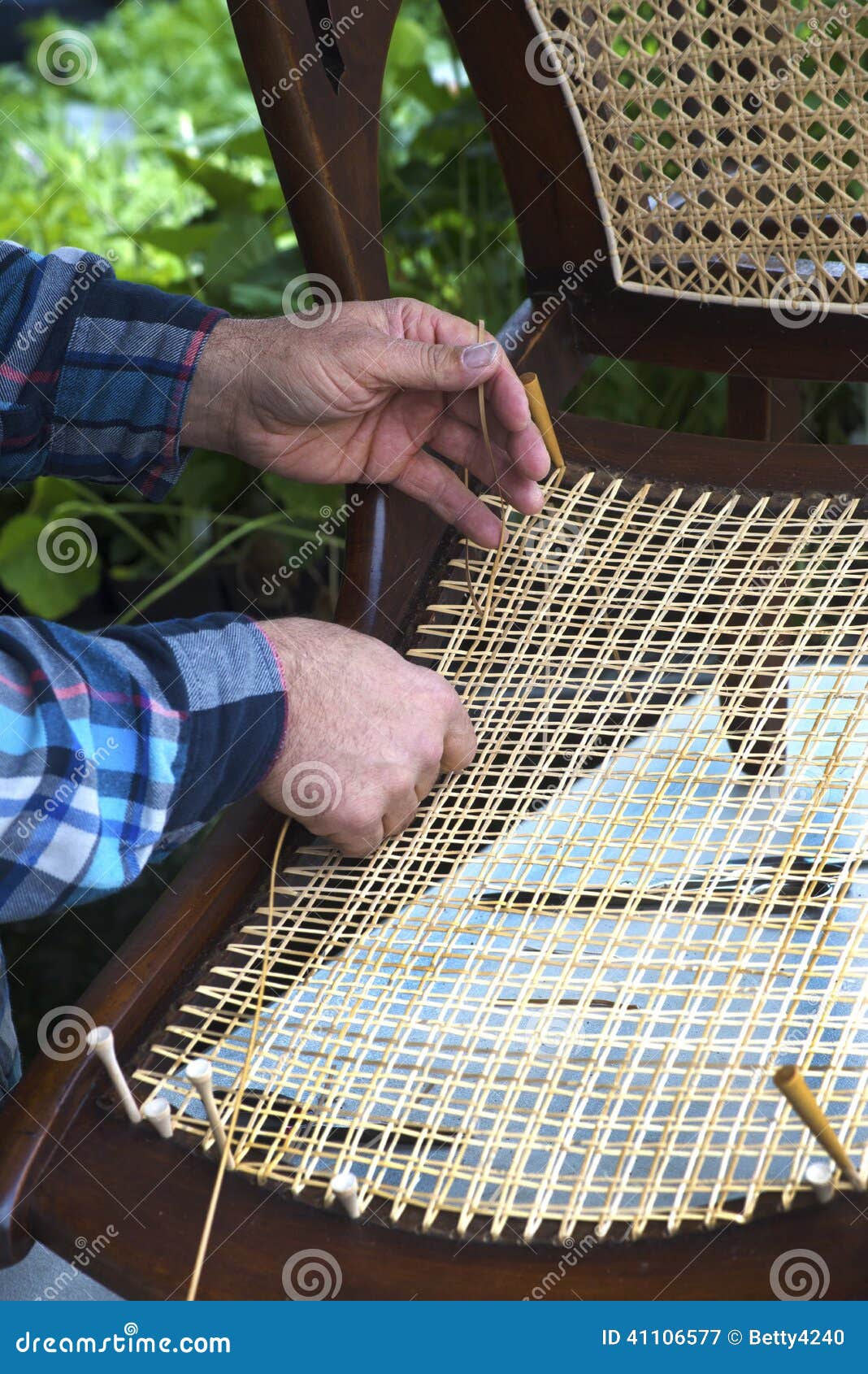 The Hands of a Craftsman Stringing a Chair Bottom. Stock Image - Image ...