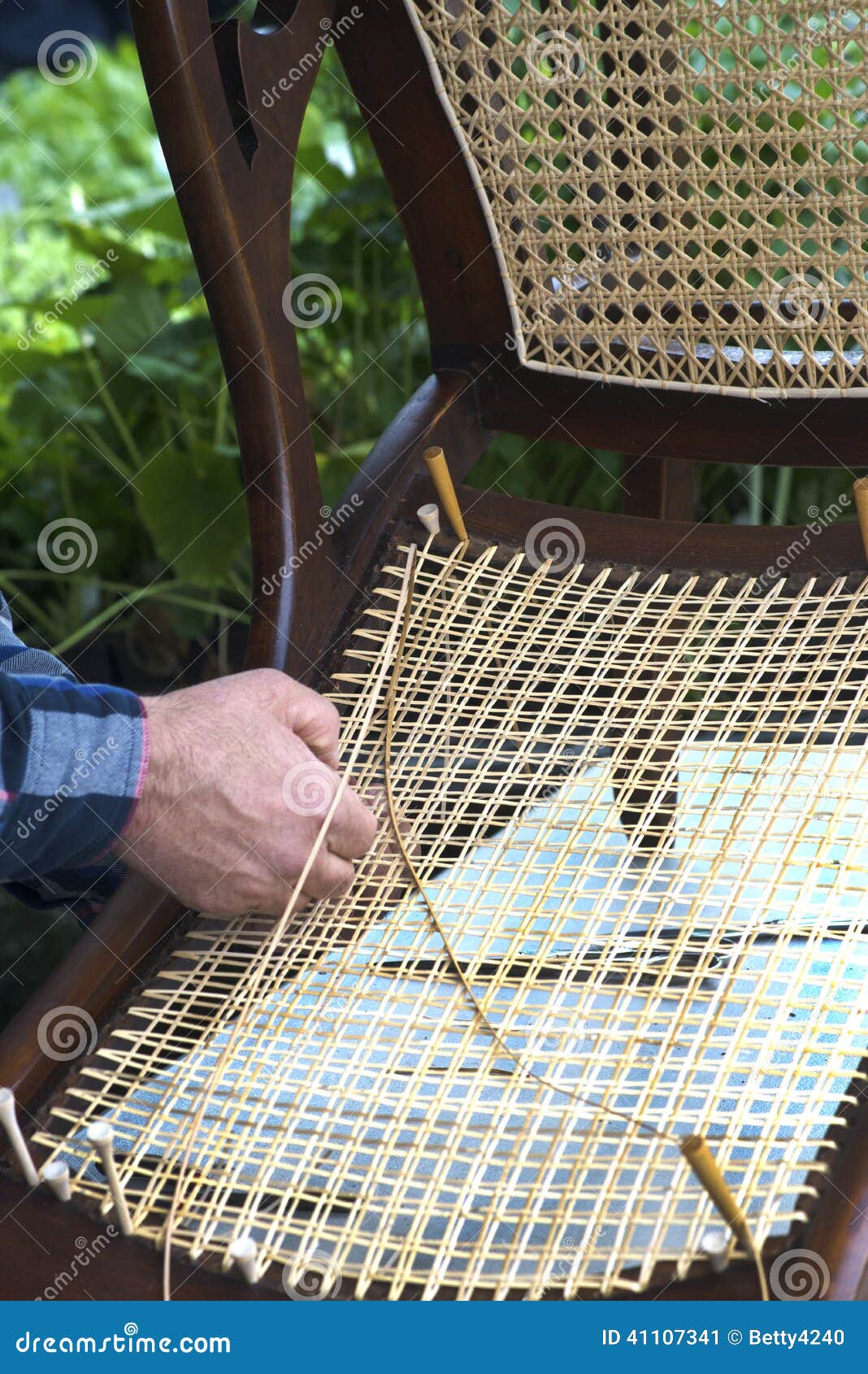 The Hands of a Craftsman Stringing a Chair Bottom. Stock Image - Image ...