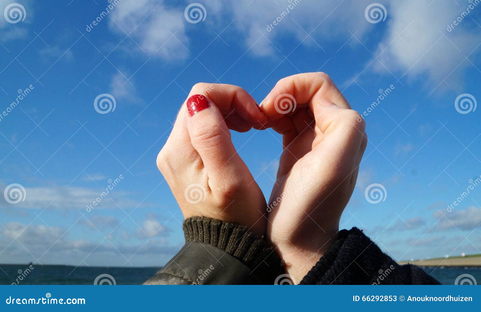 Hands Creating a Heart of Love Stock Image - Image of nature, blue ...