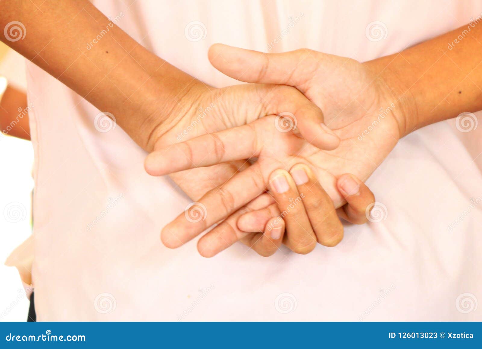 Hands Crossing Behind Photo Stock Image - Image of isolated, business ...