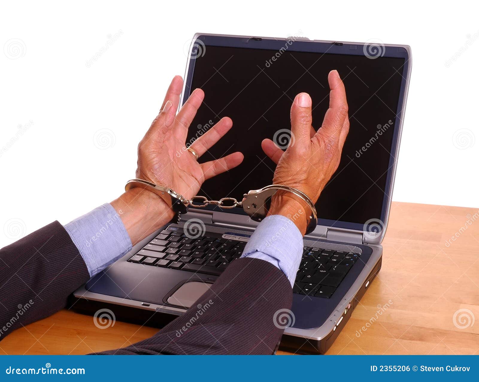 Hands Cuffed Grabbing Computer Stock Photo - Image of suit, notebook ...