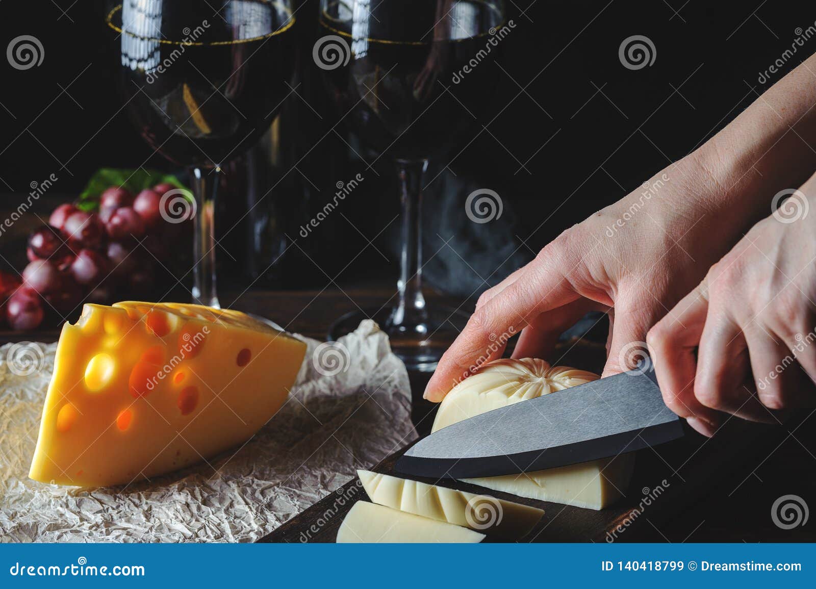 Hands Cut the Cheese To Wine Stock Image - Image of hands, dairy: 140418799