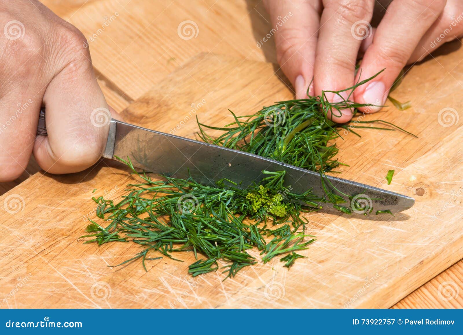 Hands Cutting Dill on the Wooden Cutting Board Stock Image - Image of ...