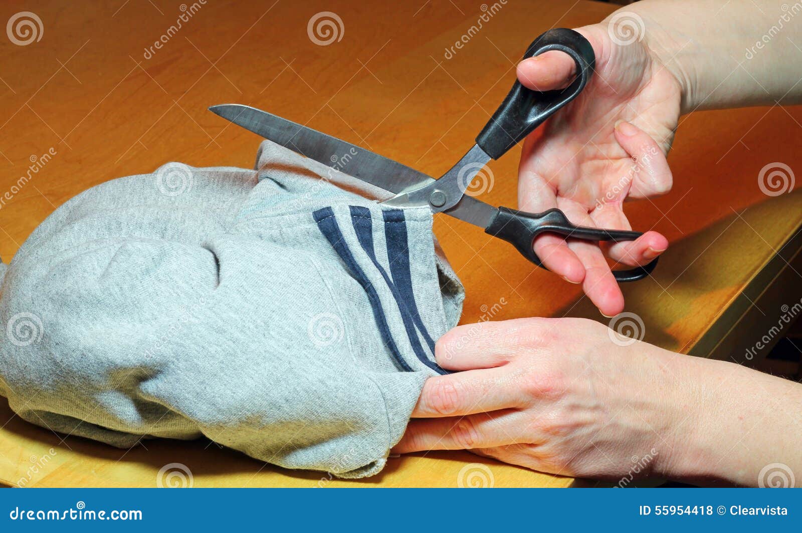Hands Cutting Material with Shears or Scissors. Stock Photo - Image of ...