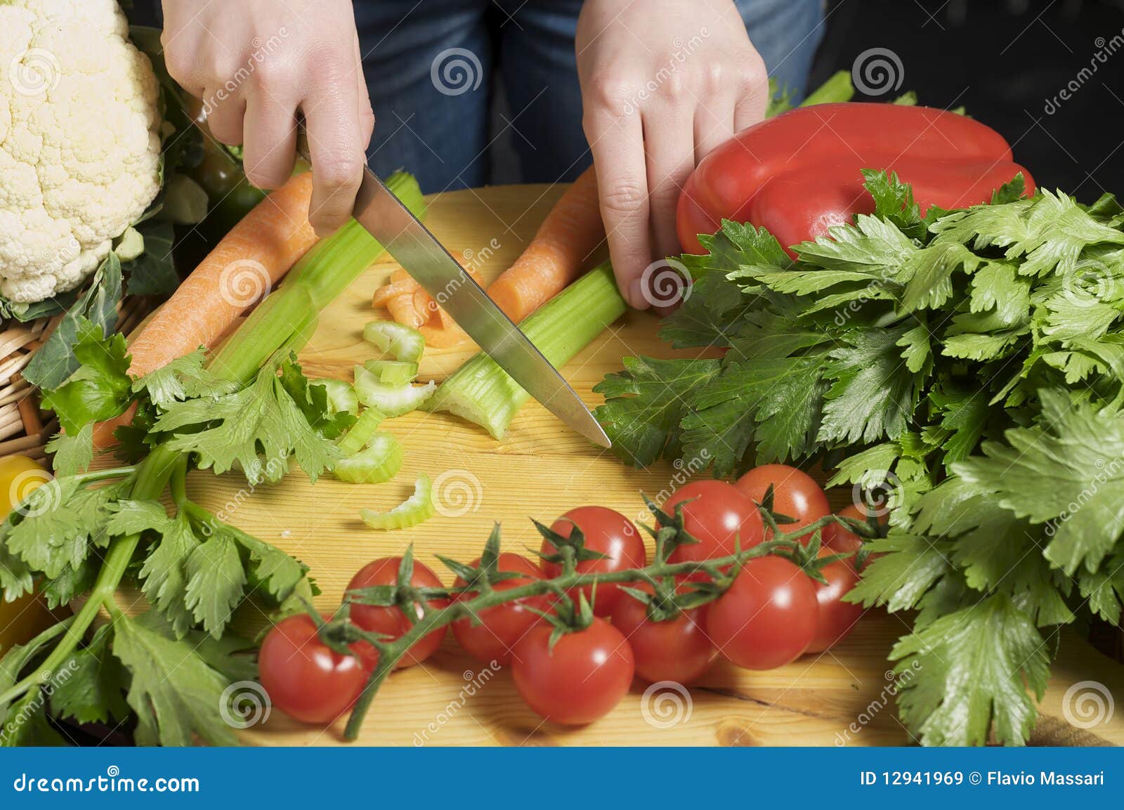 Hands cutting vegetables stock image. Image of food, human - 12941969