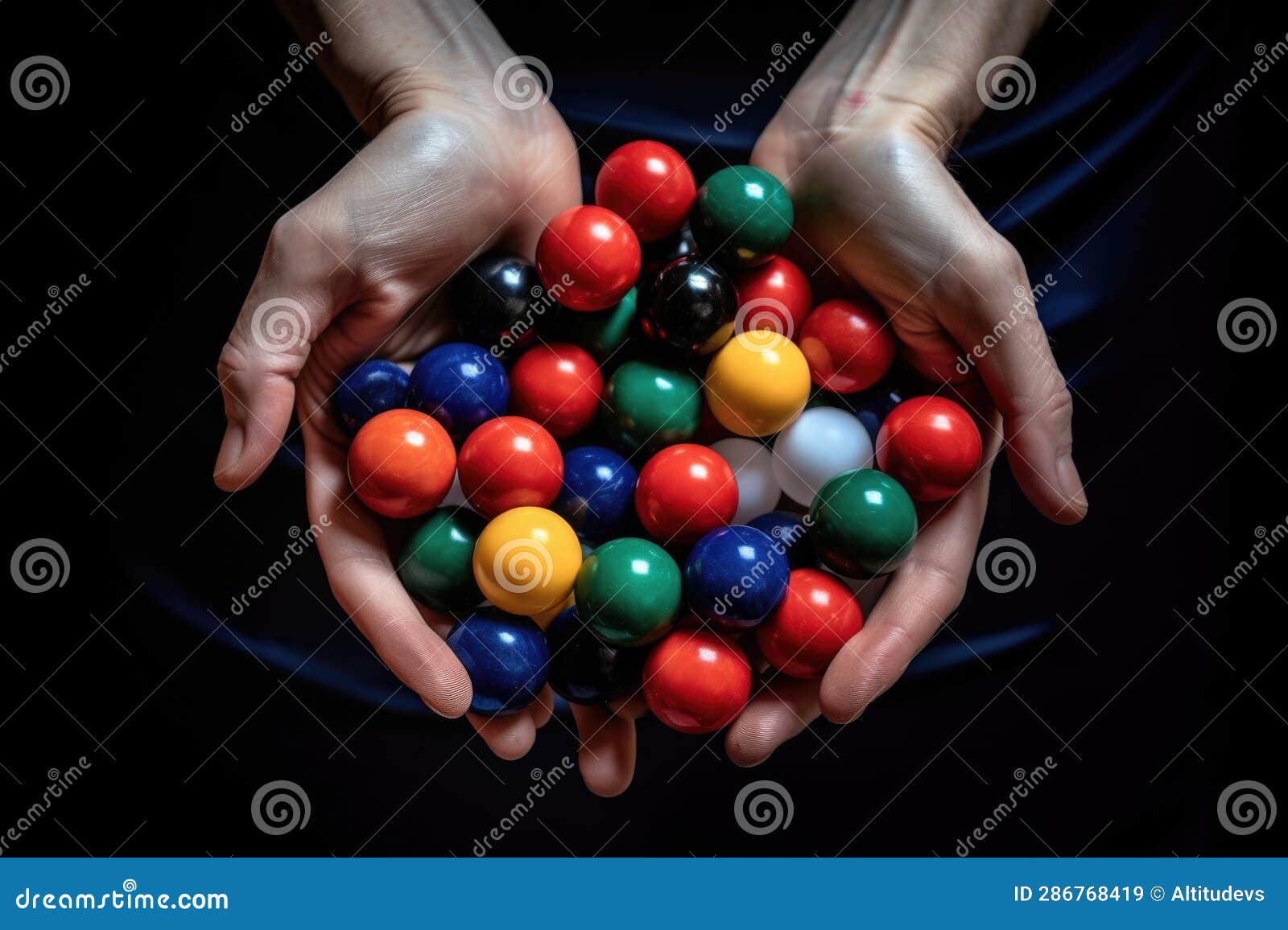 Hands Demonstrating Sleight Of Hand With A Set Of Colorful Balls ...