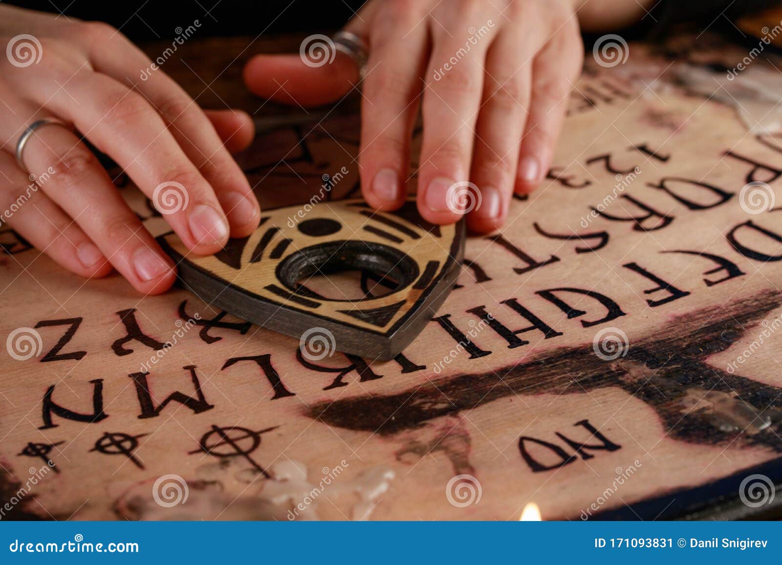 Hands on the Devil`s Board. Session of Calling Spirits Stock Image ...