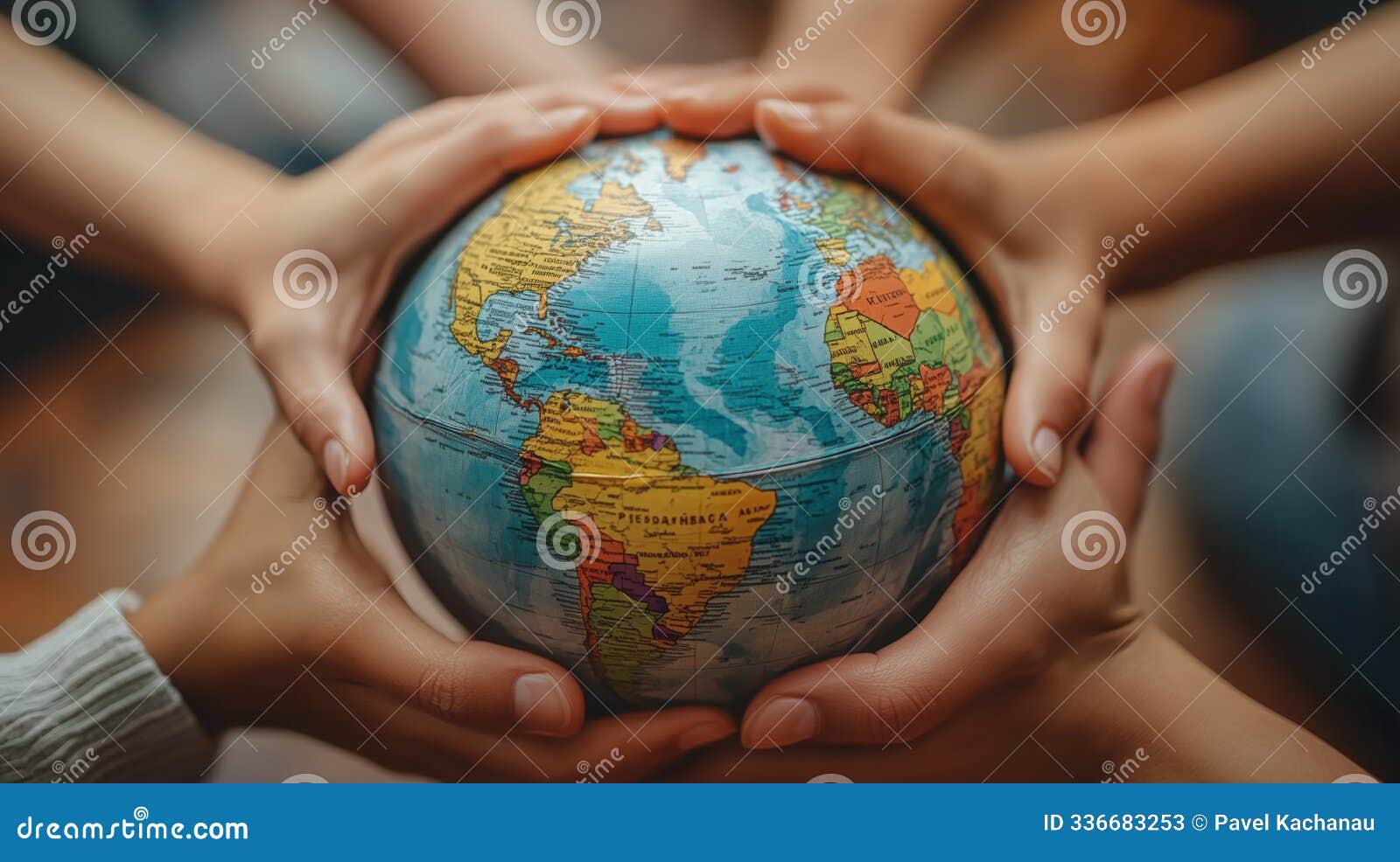 Hands of Different Nationalities Hold a Globe, Highlighting Global ...
