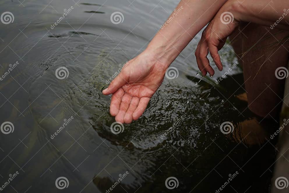 Hands Dipping in River Water Stock Image - Image of bathing, dipping ...