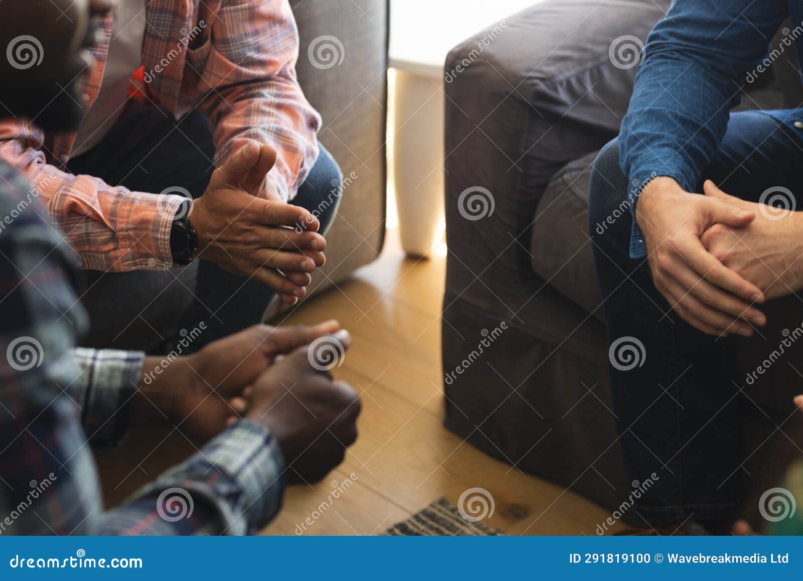 Hands of Diverse Group of Friends Talking and Supporting Each Other on ...