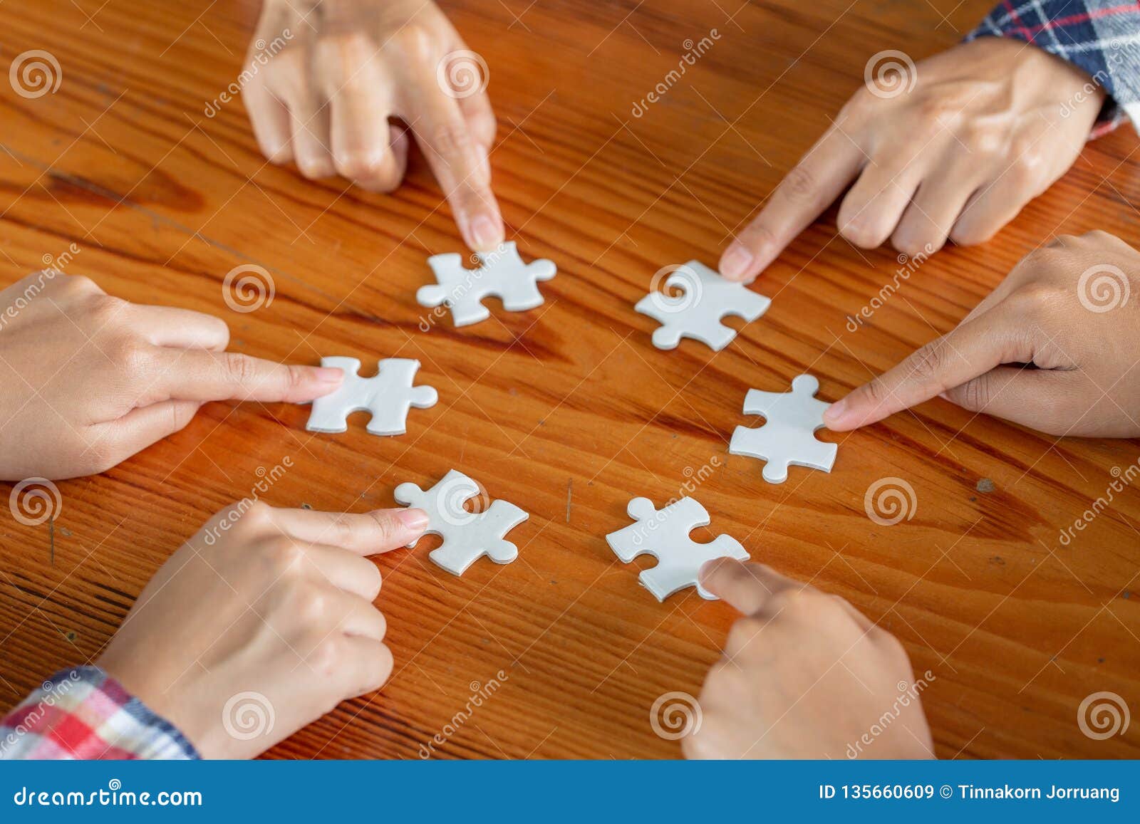 Hands of Diverse People Assembling Jigsaw Puzzle, Team Put Pieces ...