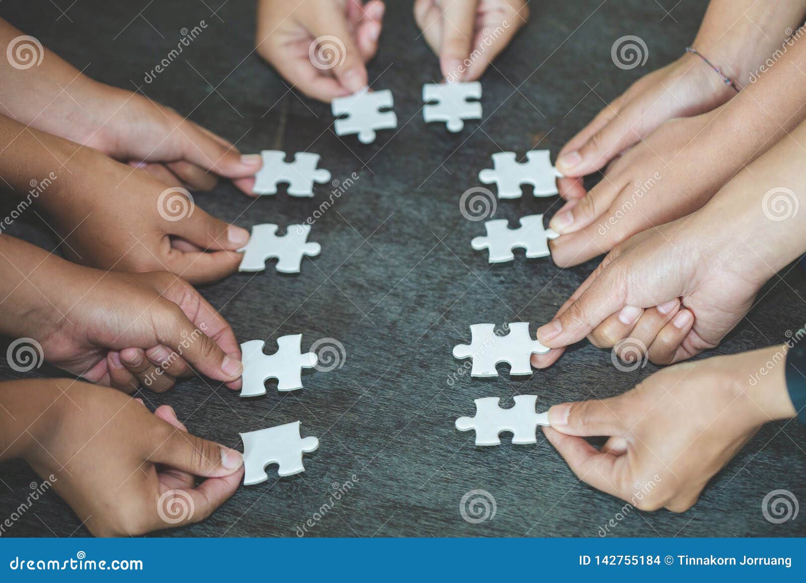 Hands of Diverse People Assembling Jigsaw Puzzle, Team Put Pieces ...
