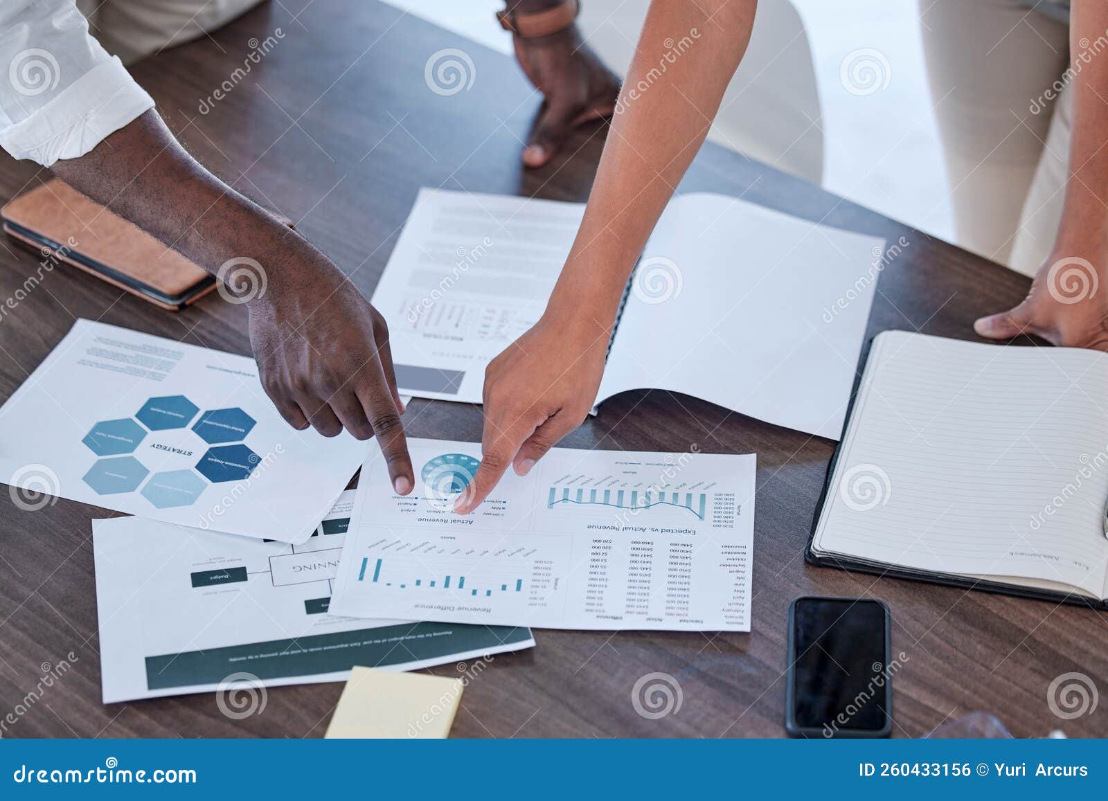 Hands of Diversity Business People Pointing at Documents, Chart Data or ...