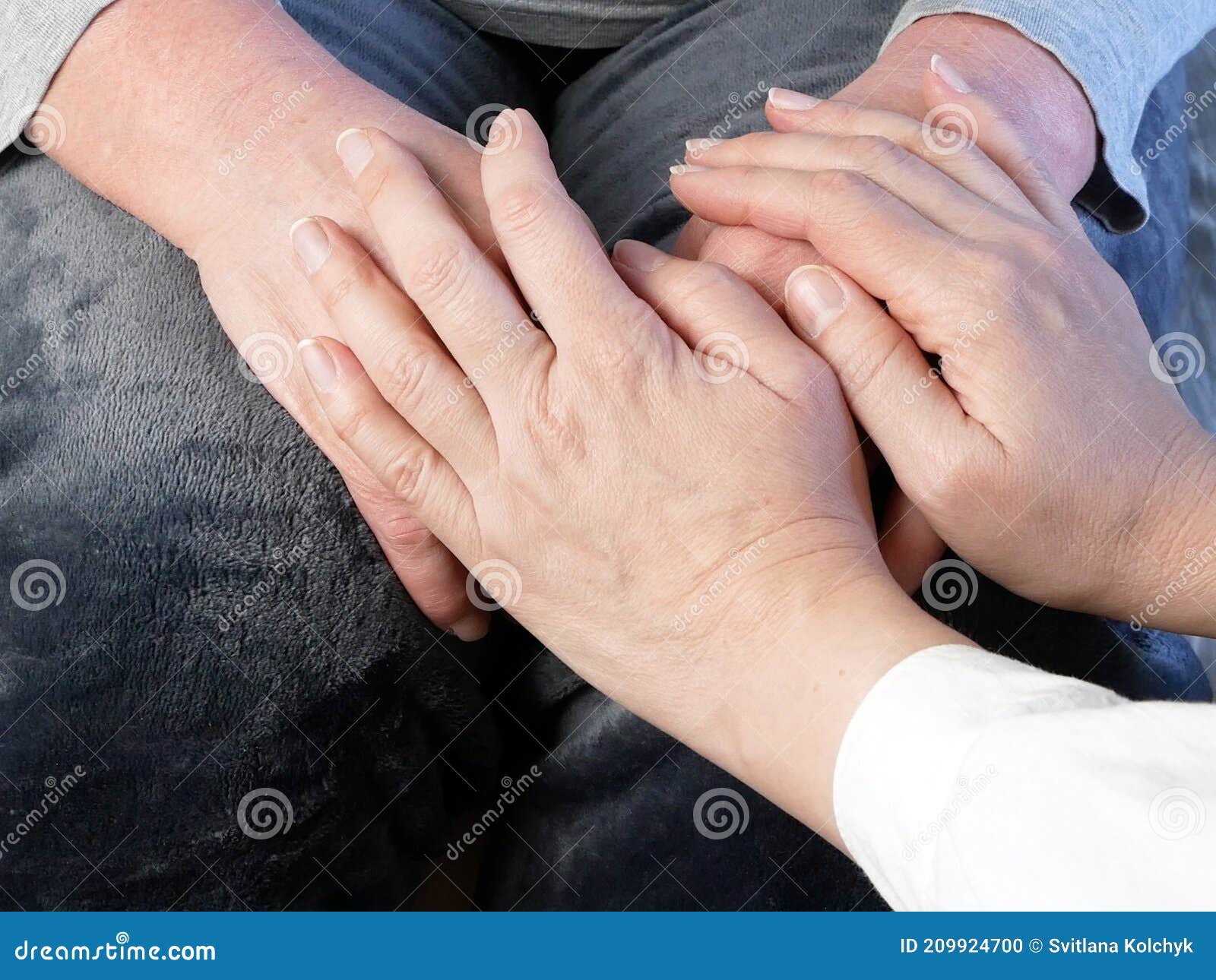 Hands of Doctor Holding Patient`s Hands As Expression of Care and ...