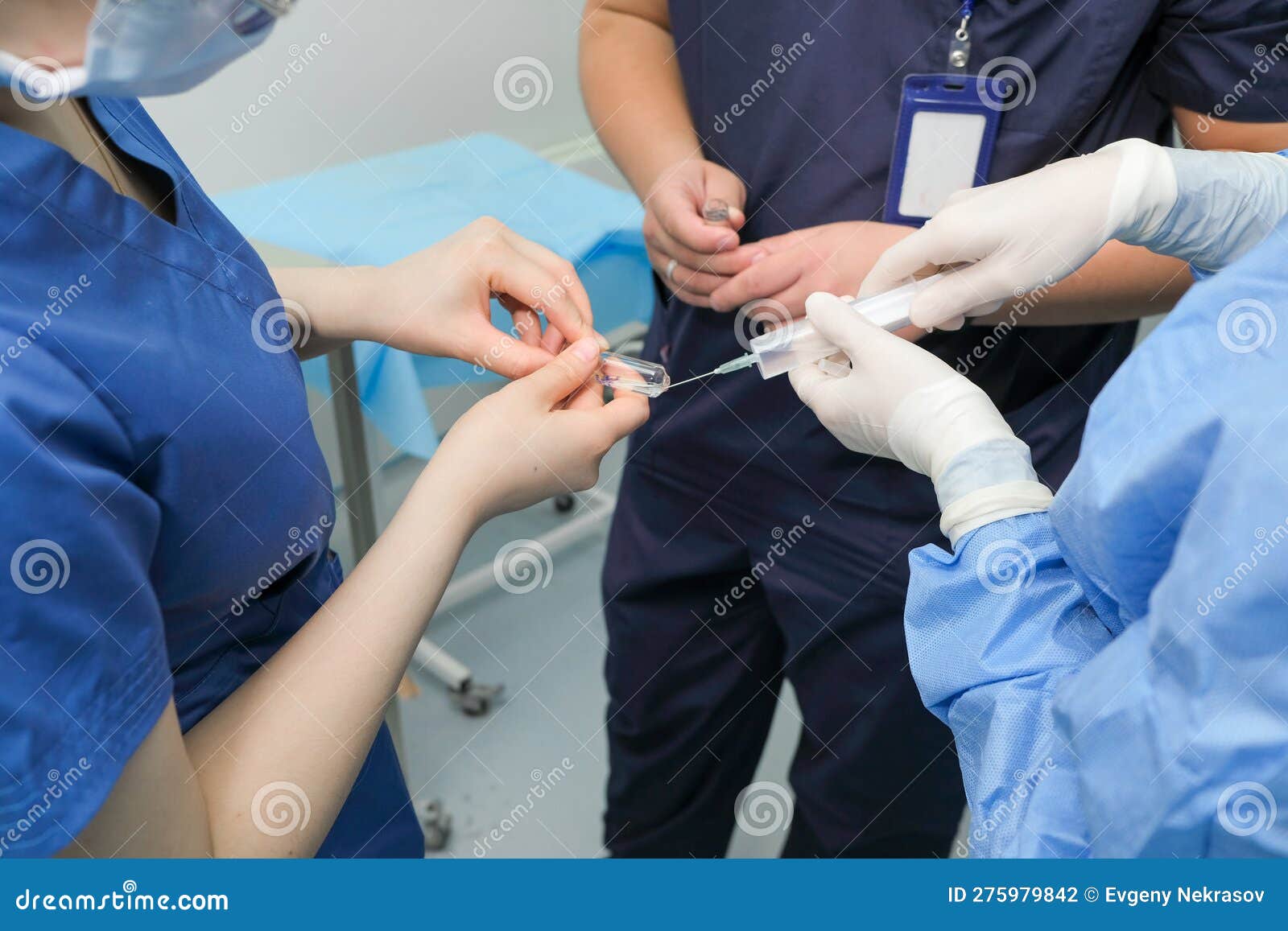 The Hands of Doctors Fill the Syringe with Drugs from the Ampoule Stock ...
