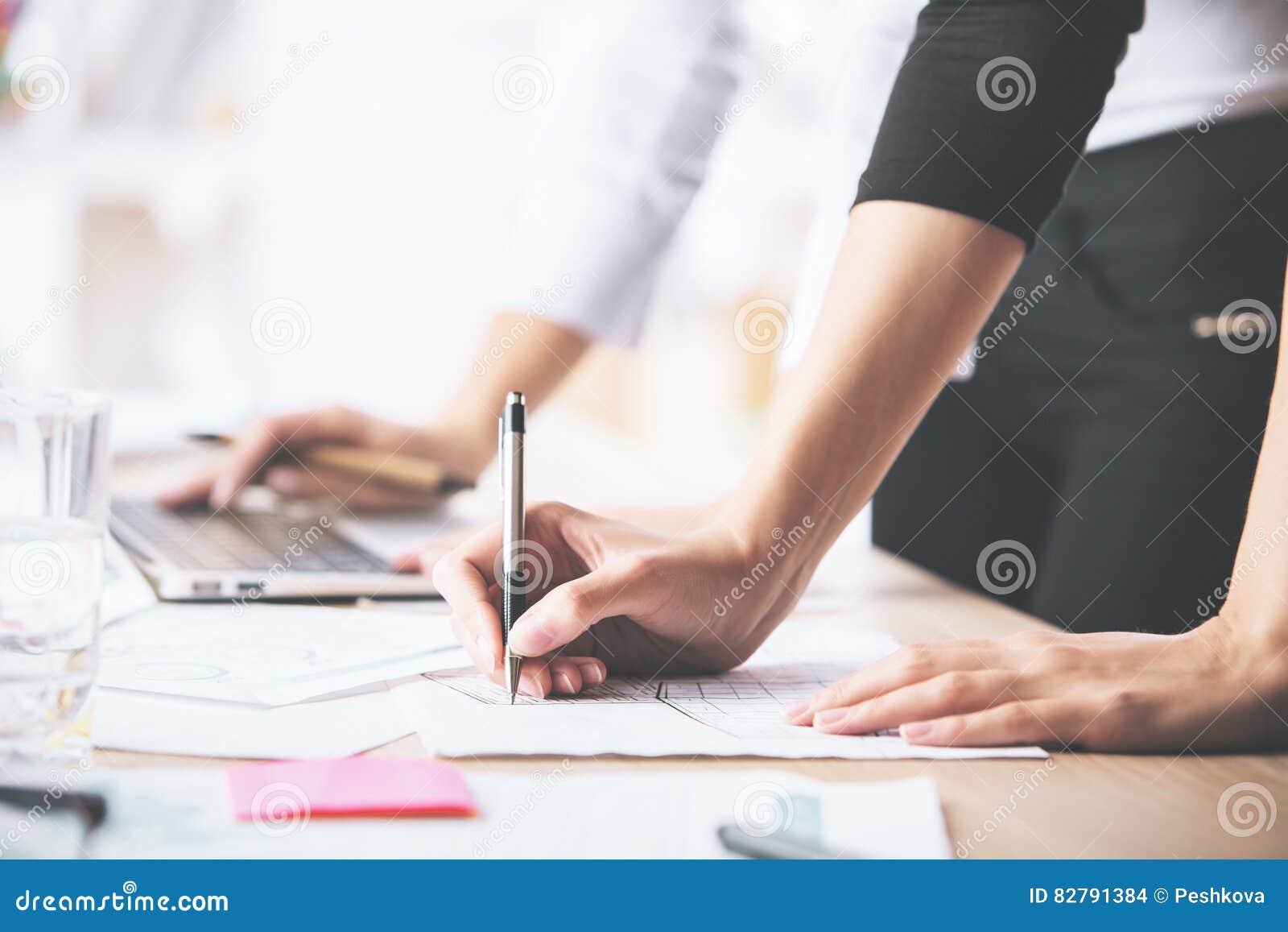 Hands Doing Paperwork and Using Laptop Stock Photo - Image of females ...
