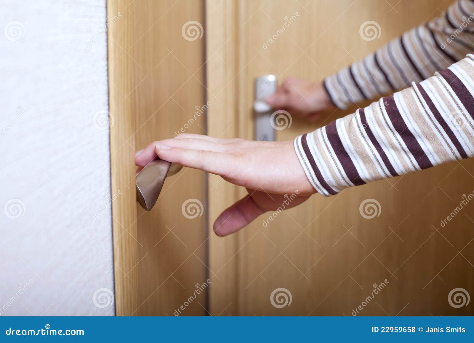 Hands and doors. stock photo. Image of estate, person - 22959658