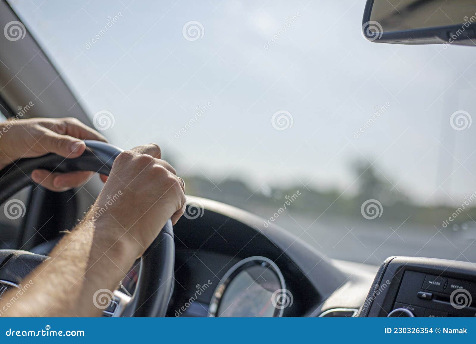 Hands of the Driver Driving a Car in the Road, Horizontal Stock Photo ...