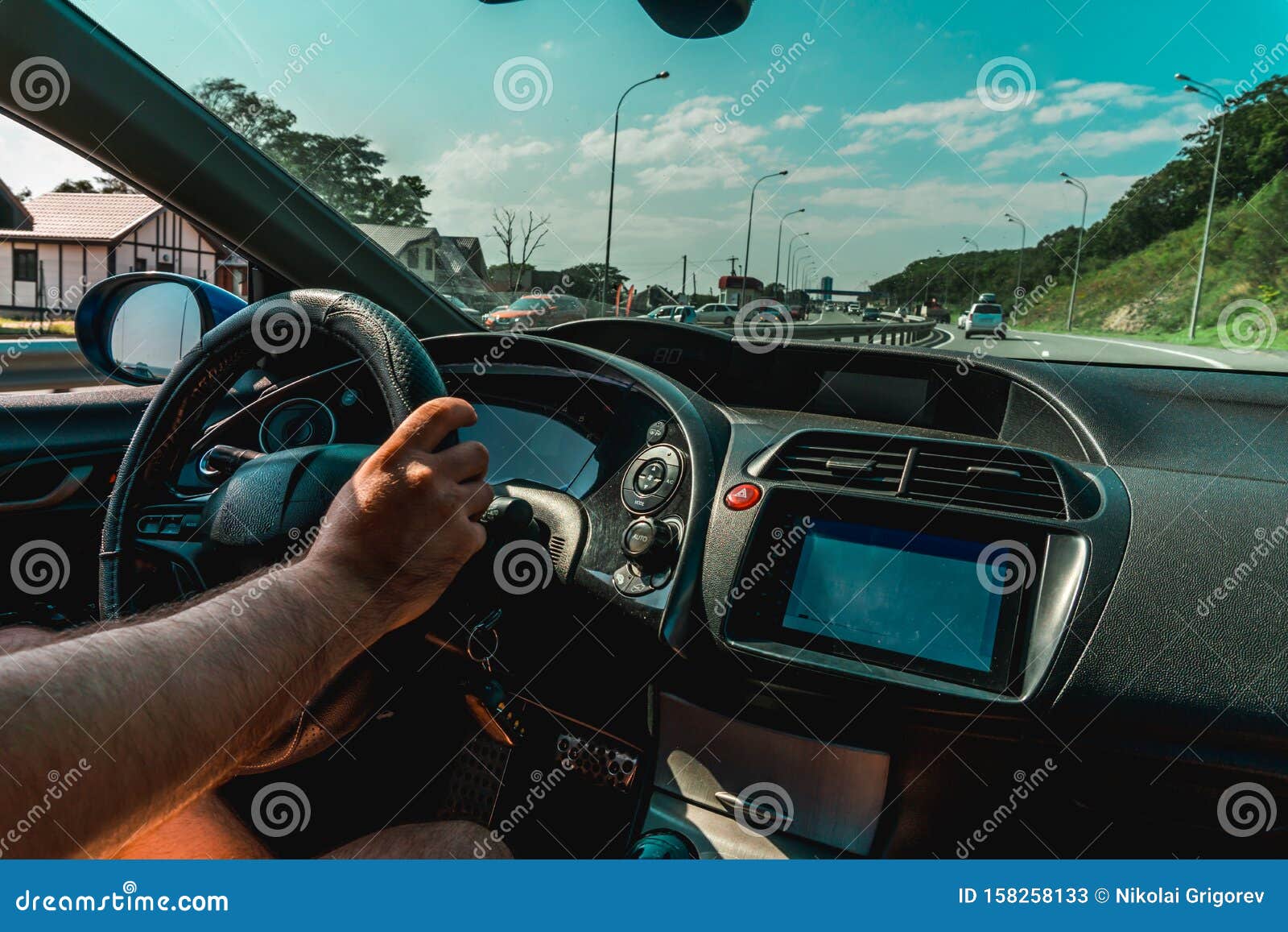 Hands of the Driver on the Steering Wheel Inside the Car Stock Image ...
