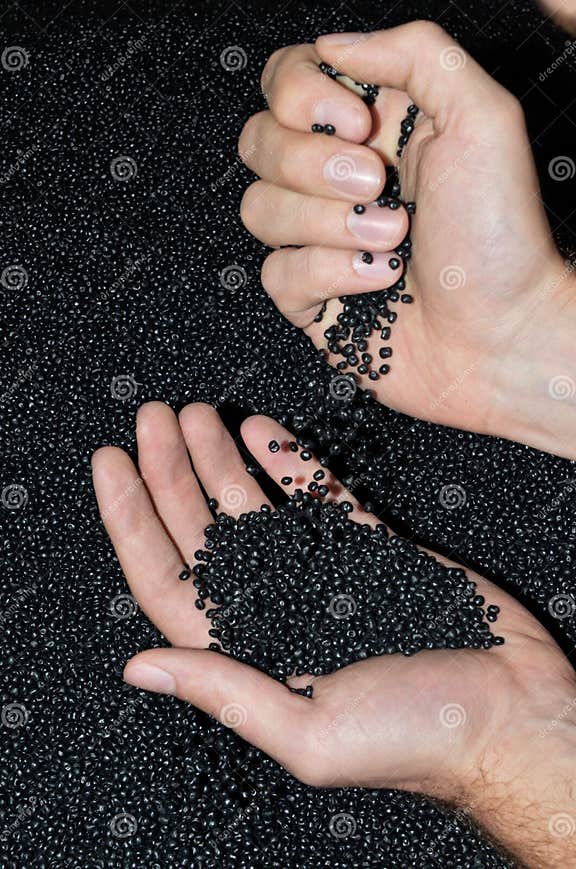 Hands Dumping Polymer Resin Stock Photo - Image of final, hand: 26889340