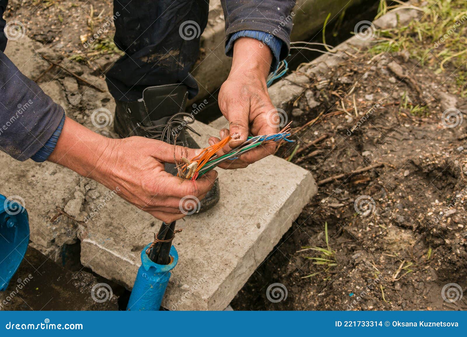 The Hands of an Electrician are Assembling a Box of Electrical ...