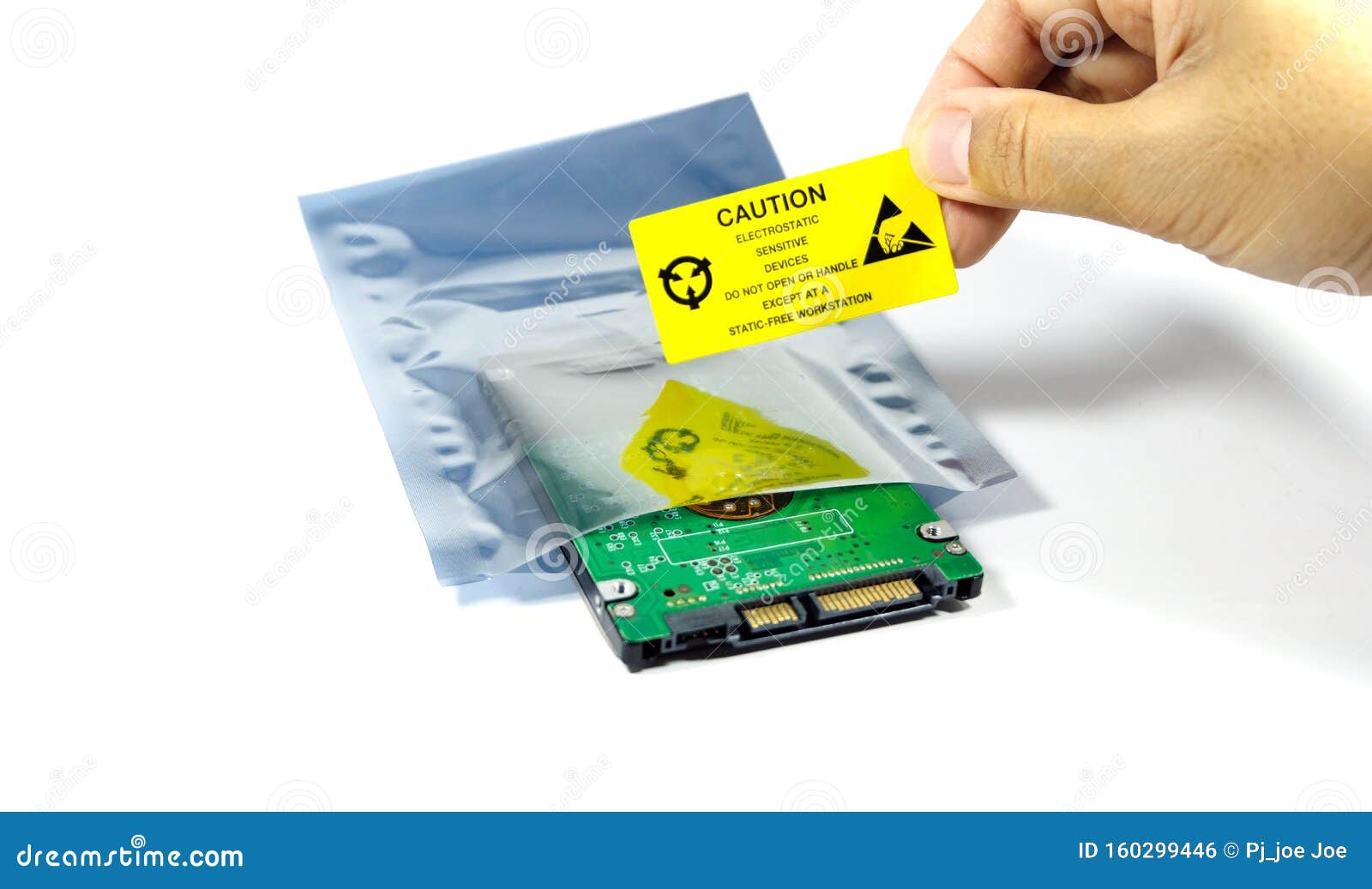 Hands Of The Engineers Who Are Labeling The ESD Protection Label On The ...