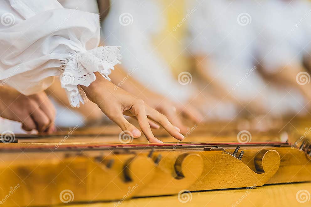 Hands on Ethnic instrument stock photo. Image of instrument - 96467562