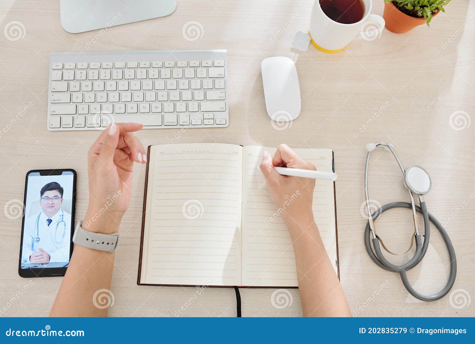General Practitioner Taking Notes in Planne Stock Image - Image of ...