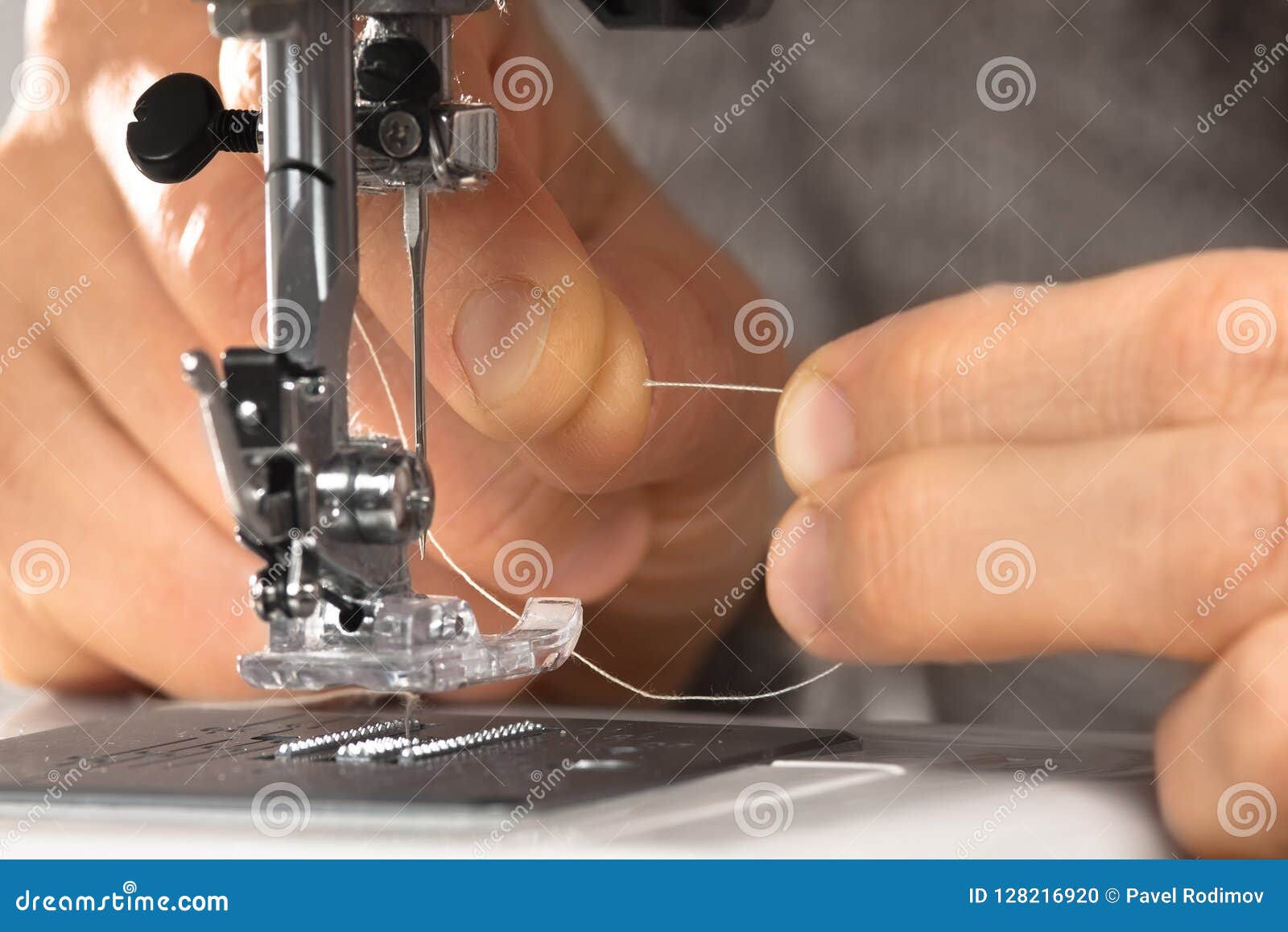 Hands Fill the Thread in the Sewing Machine Stock Photo - Image of ...