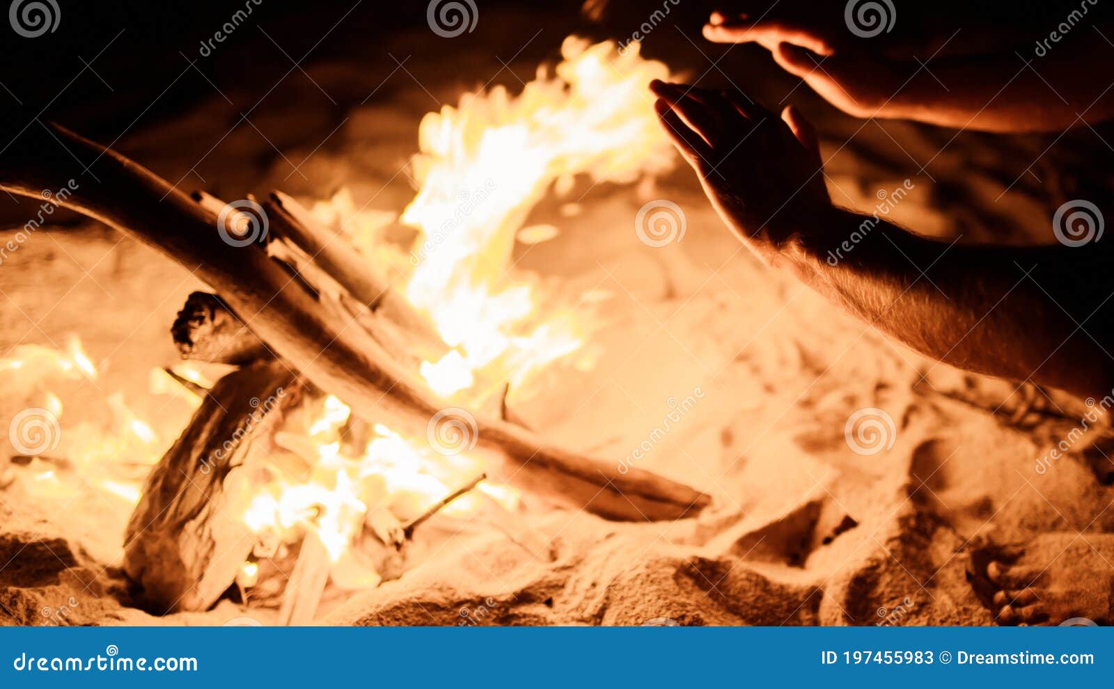 Hands by the Fire on the Beach Stock Image - Image of hand, male: 197455983