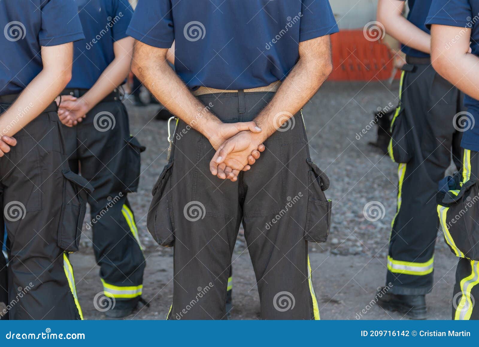 Hands of Firefighters in Formation. Back View Stock Photo - Image of ...