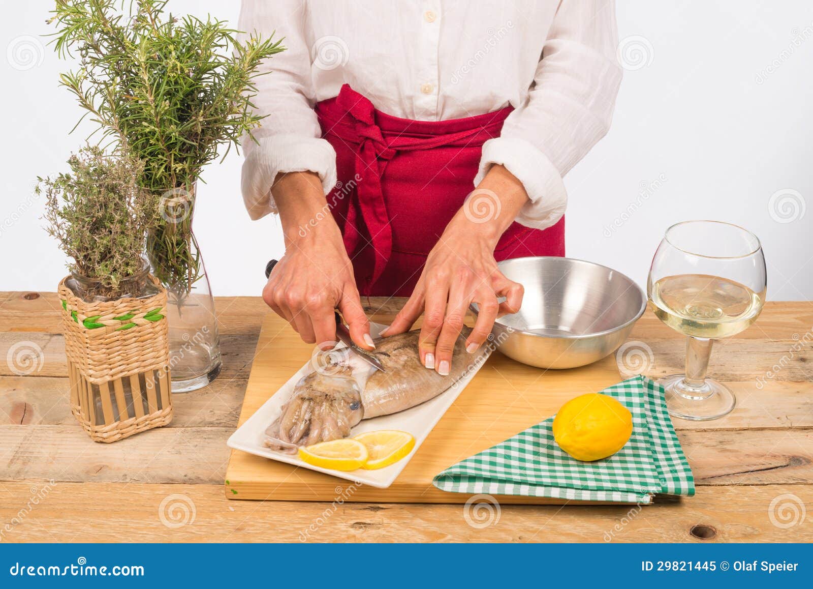 Flaying a cuttlefishl stock image. Image of fish, hands - 29821445