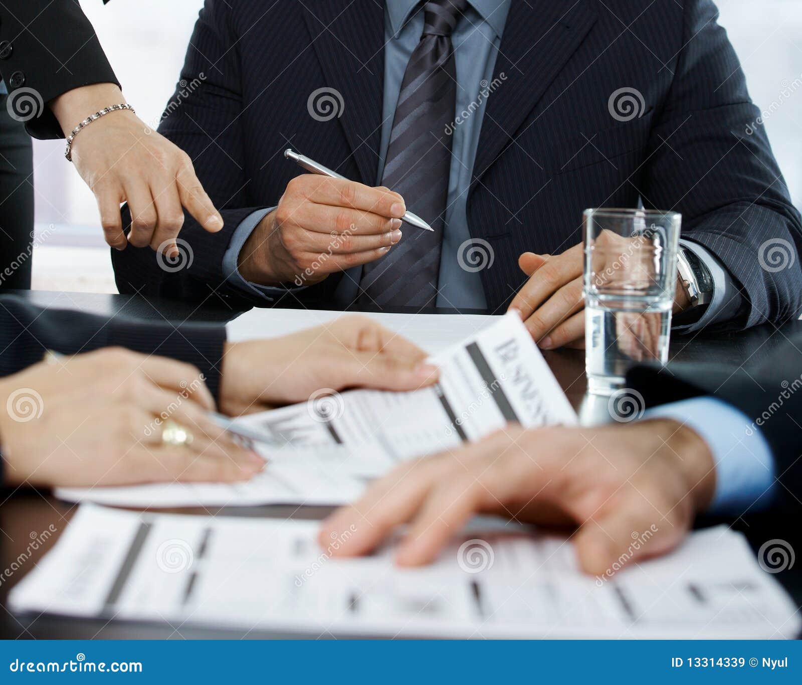 Hands in Focus at Business Meeting Stock Image - Image of deal, color ...
