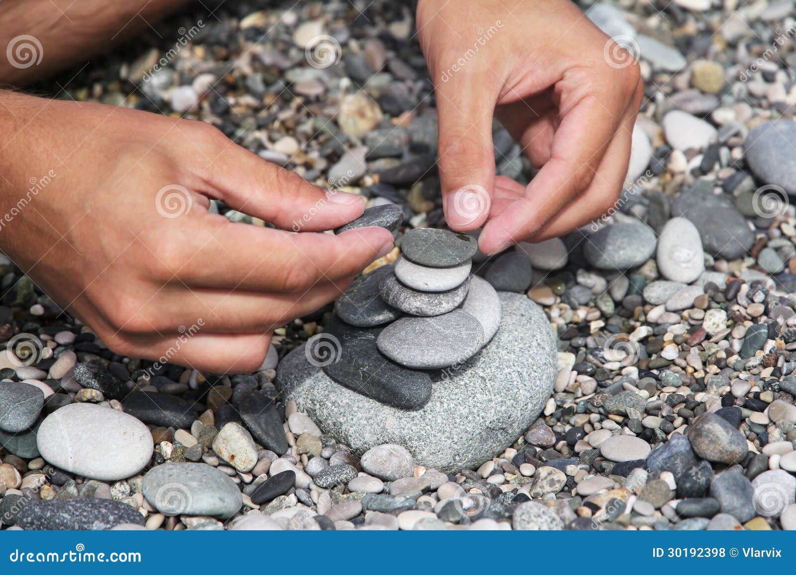 Hands folded small stones stock photo. Image of hands - 30192398