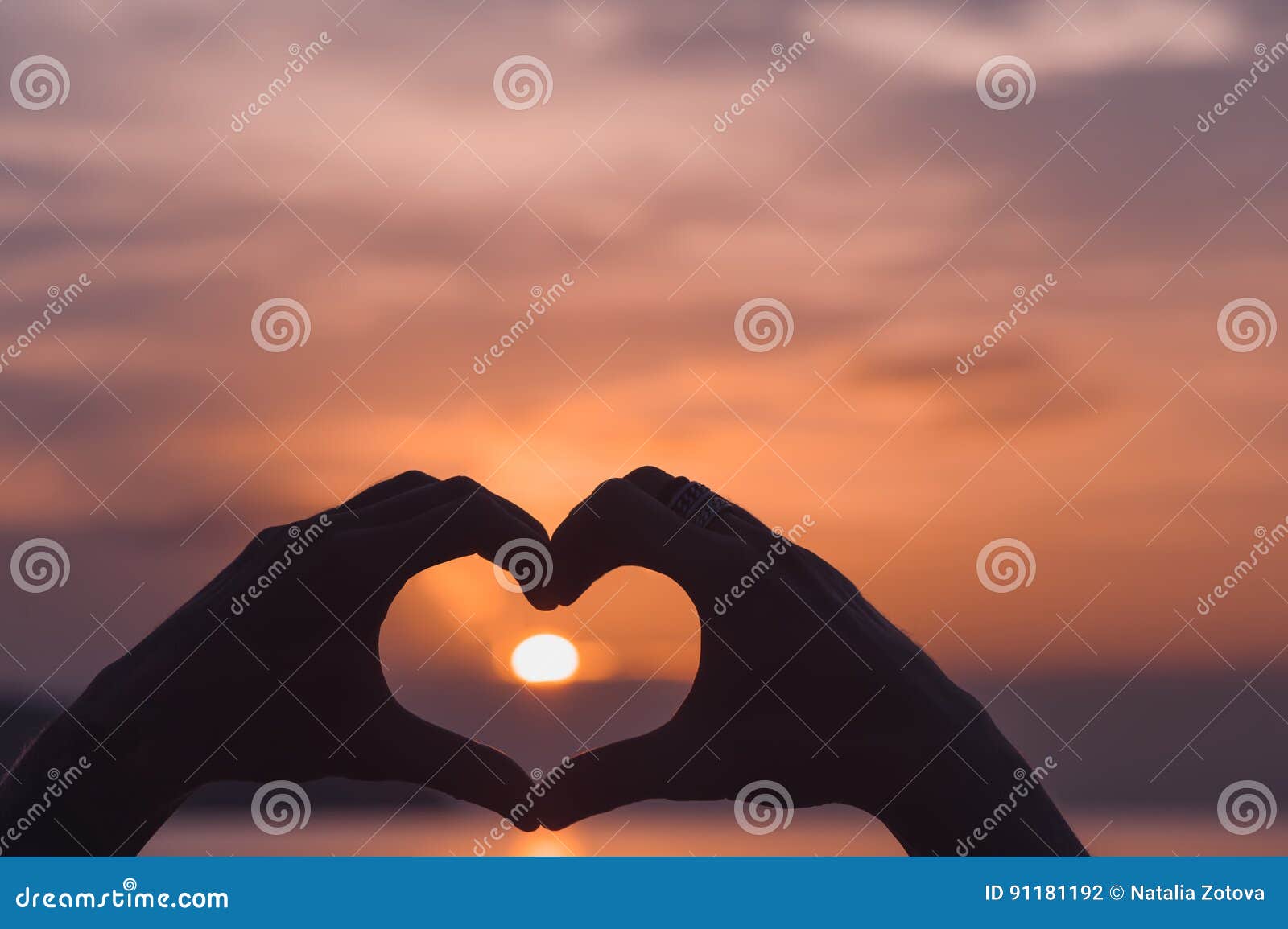Hands Forming a Heart Shape with Sunset Stock Photo - Image of person ...