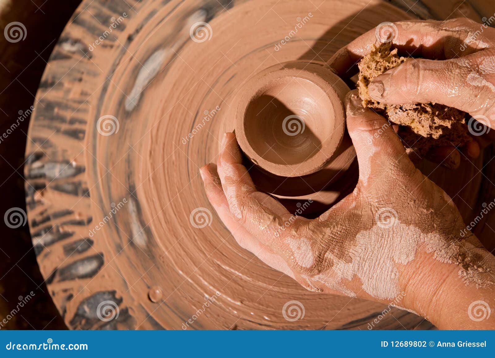 Hands forming pot on wheel stock photo. Image of artist - 12689802