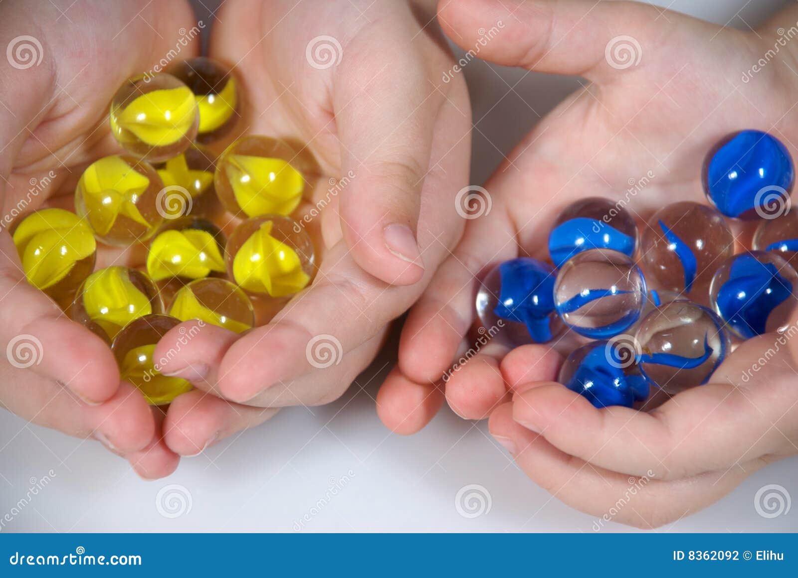 Hands full of marbles stock photo. Image of ball, games - 8362092