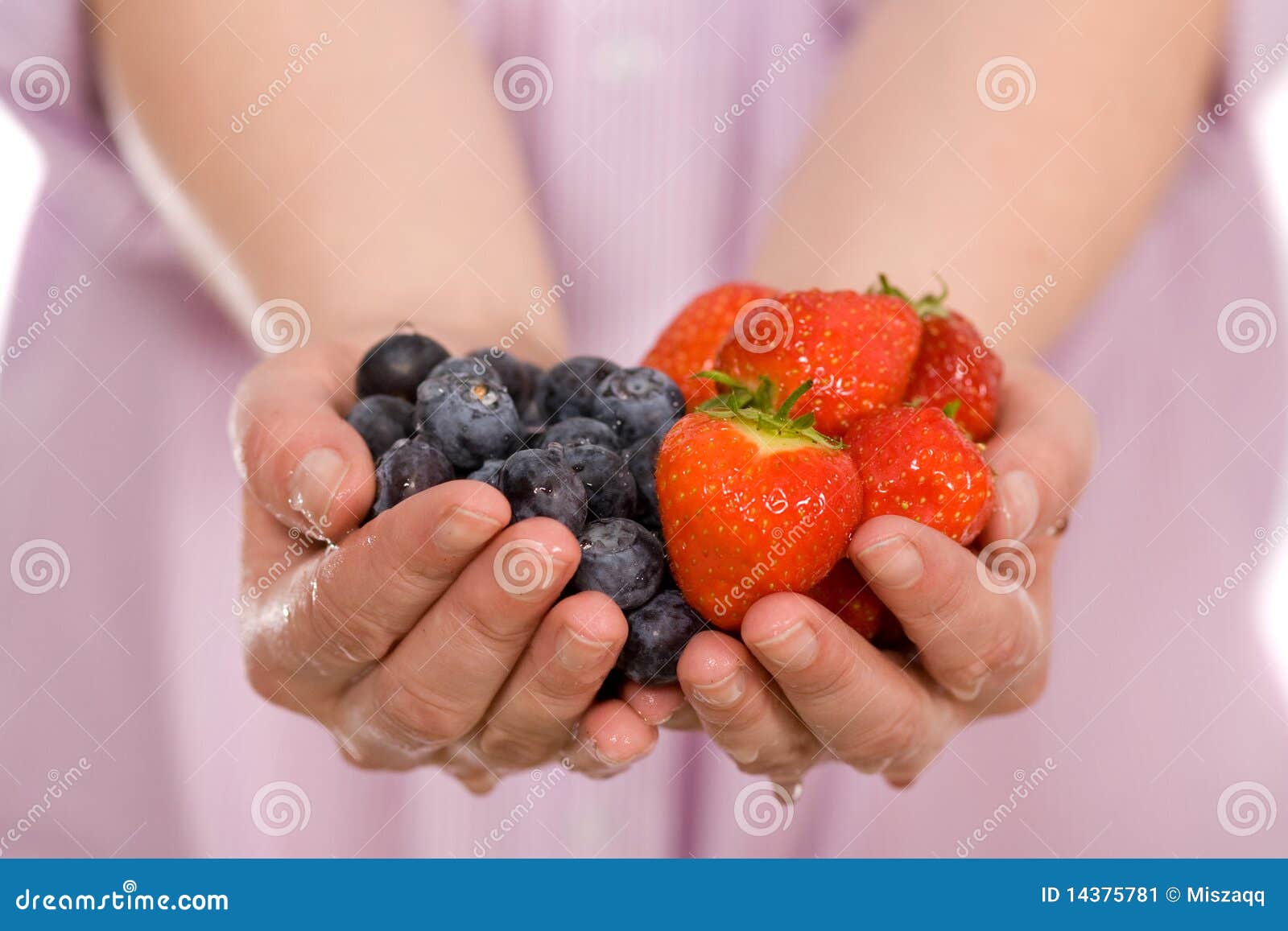 Hands Full of Strawberries and Blueberries Stock Image - Image of berry ...