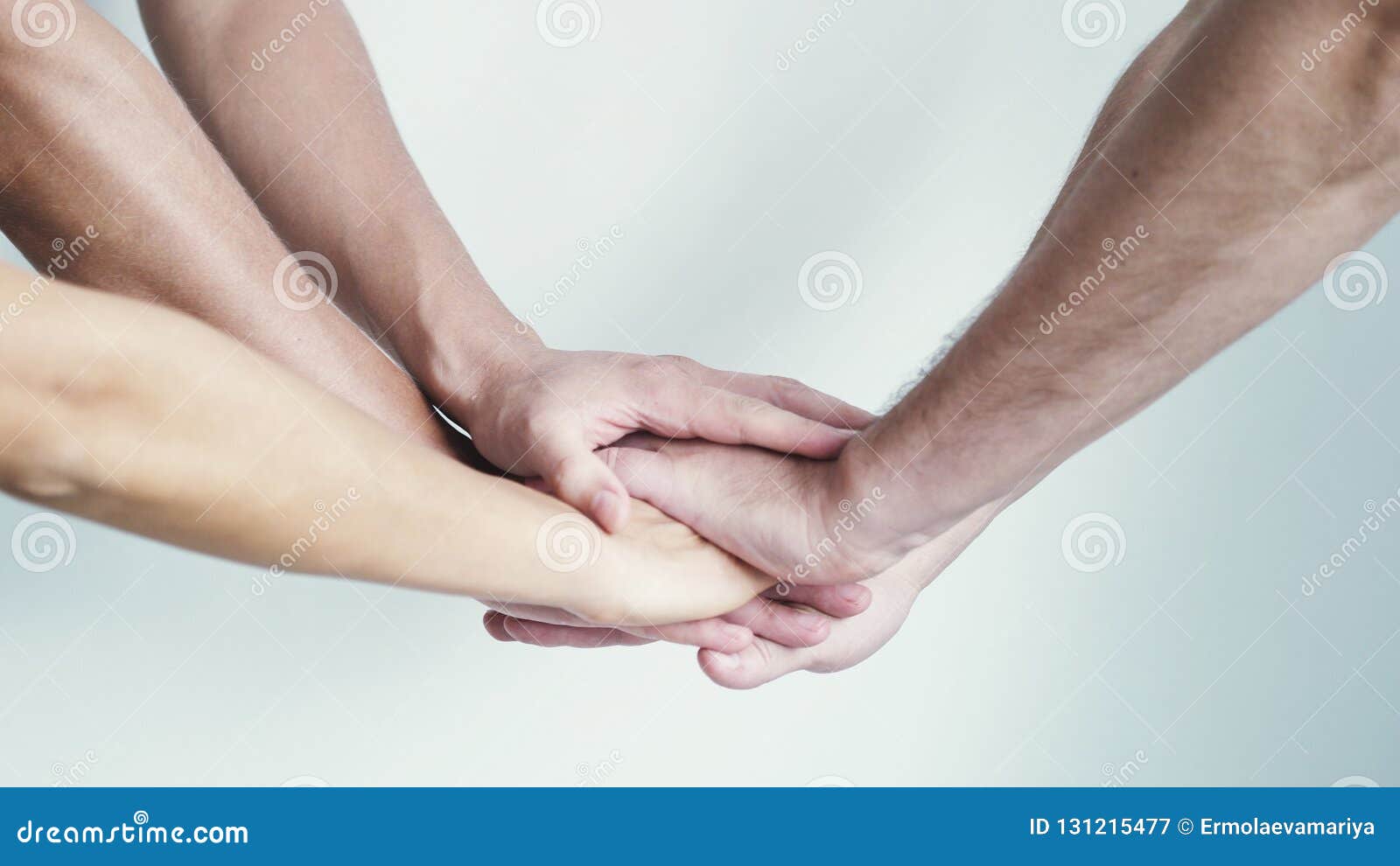 Four Hands Getting Together on a White Background. Stock Image - Image ...