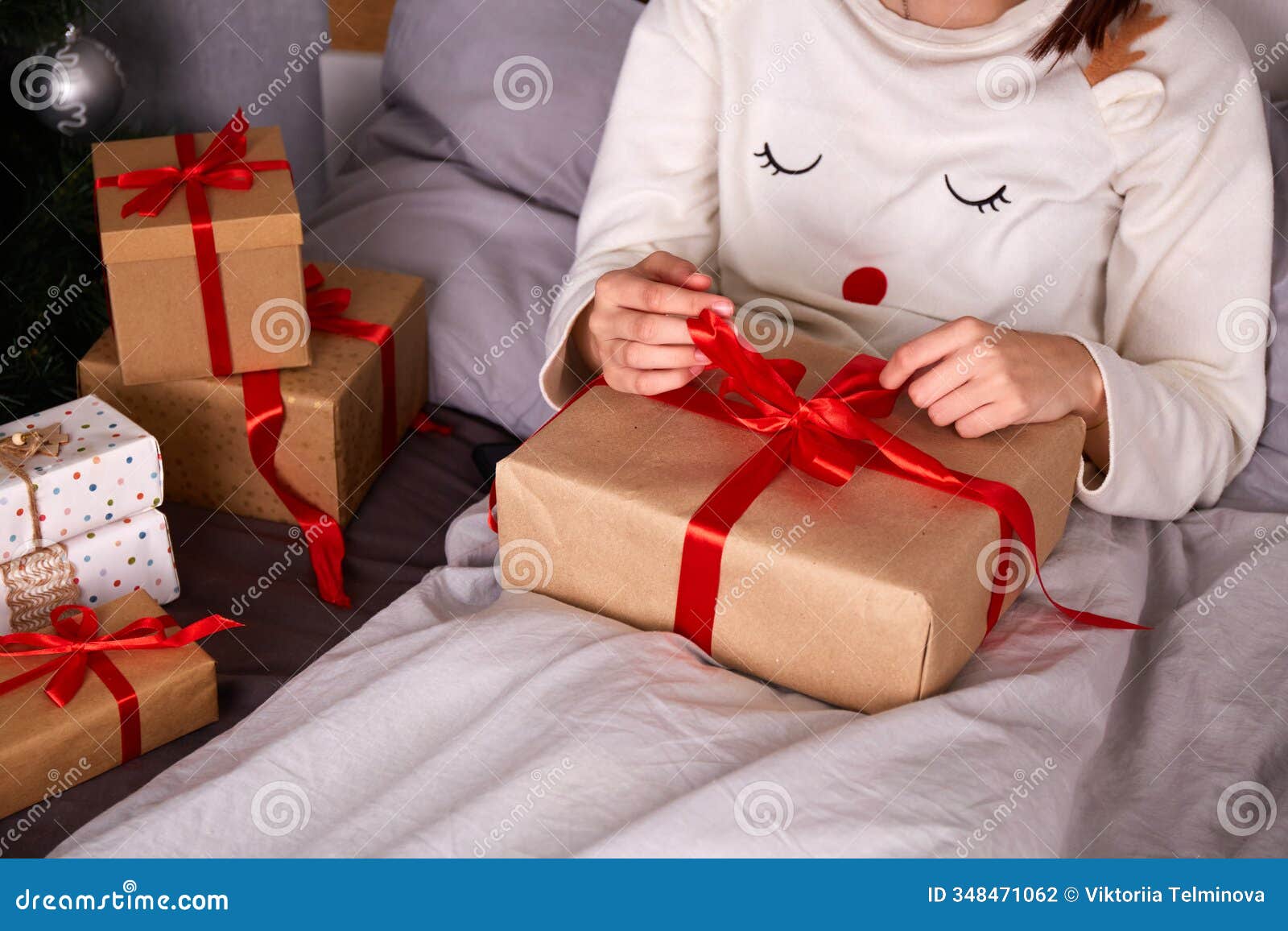 Hands of a Girl Opening a Christmas Gift Stock Photo - Image of ...