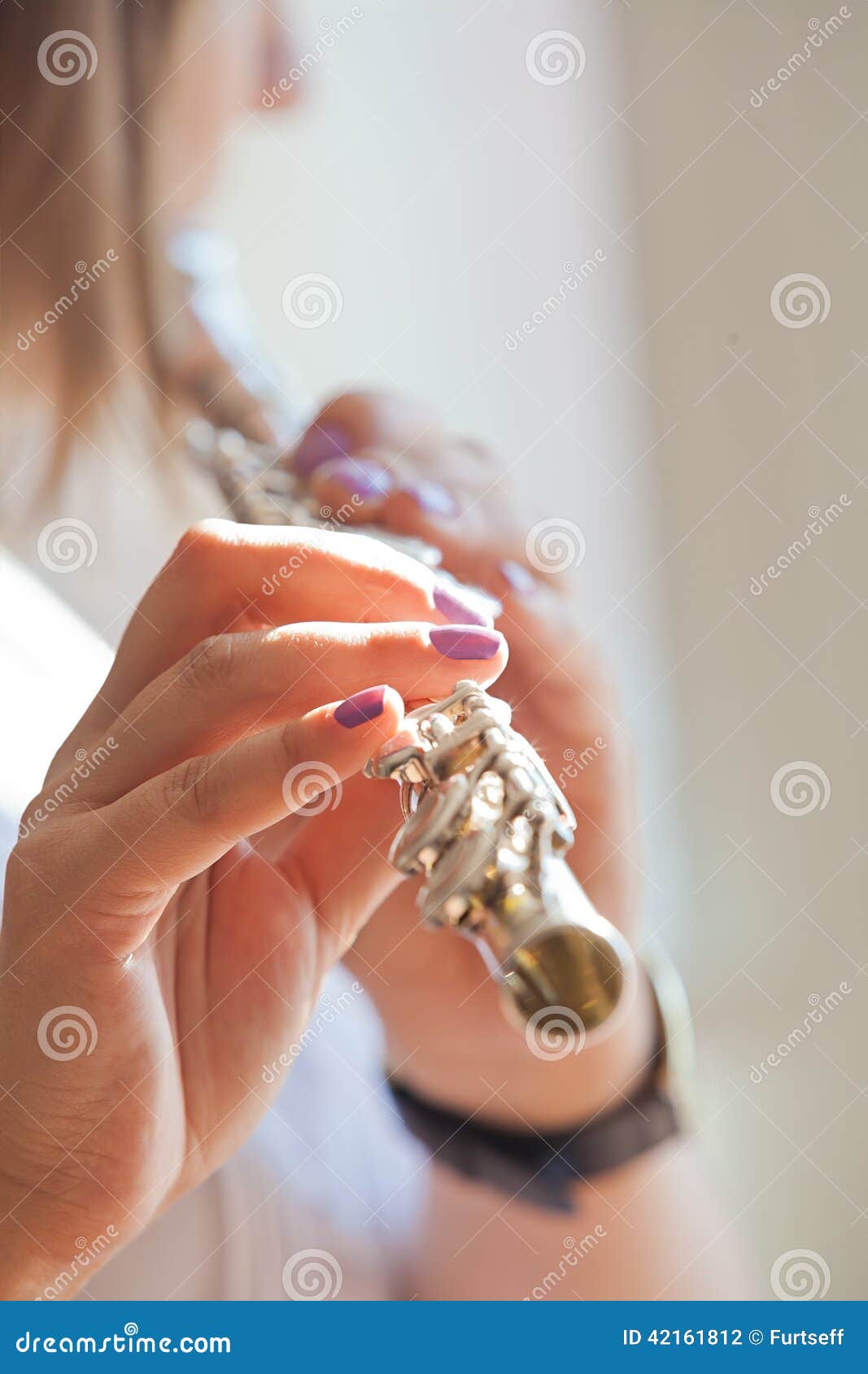 Hands girl playing a flute stock photo. Image of female - 42161812
