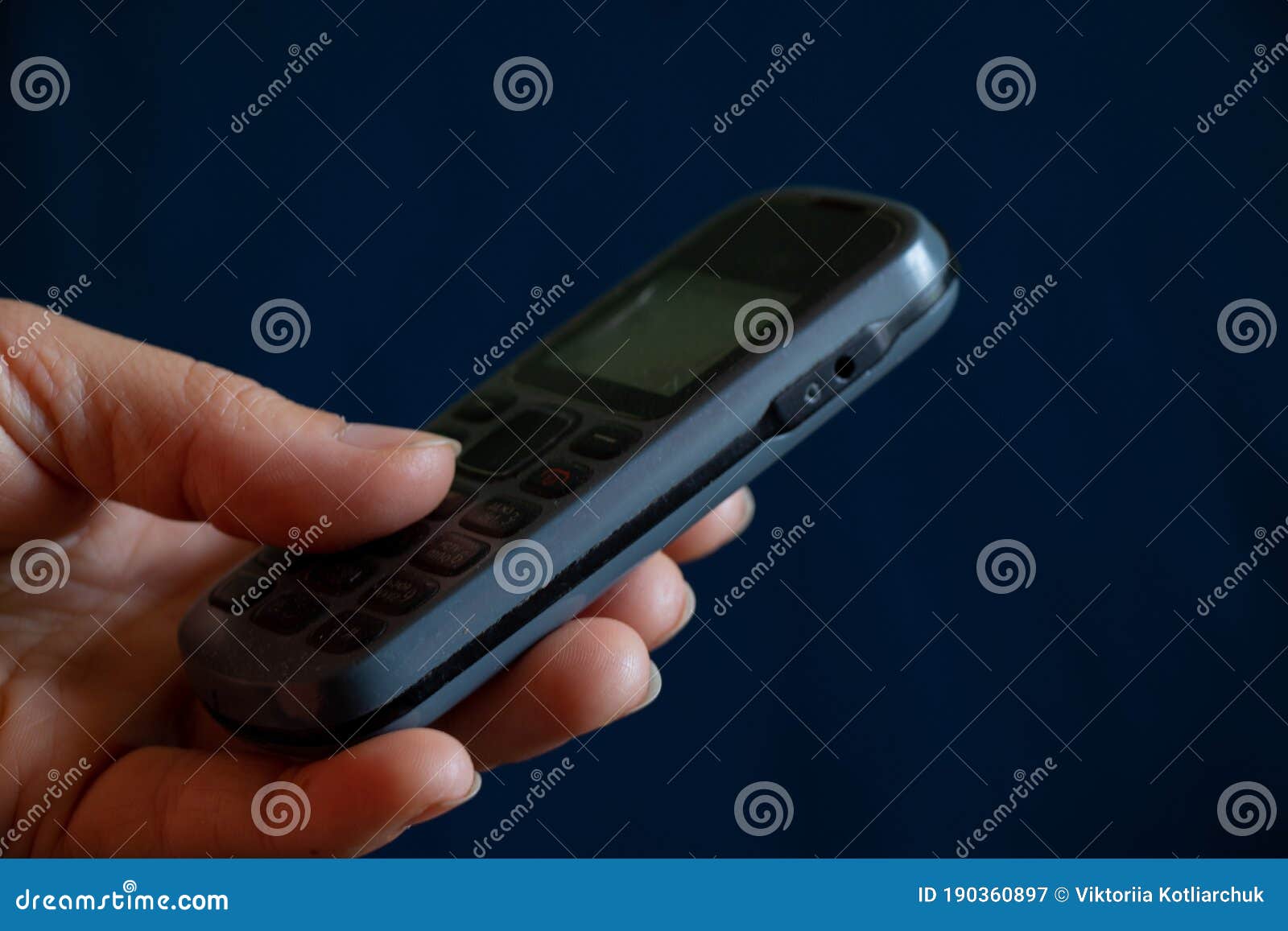 In the Hands of a Girl Push-button Old Mobile Phone Close-up Stock ...