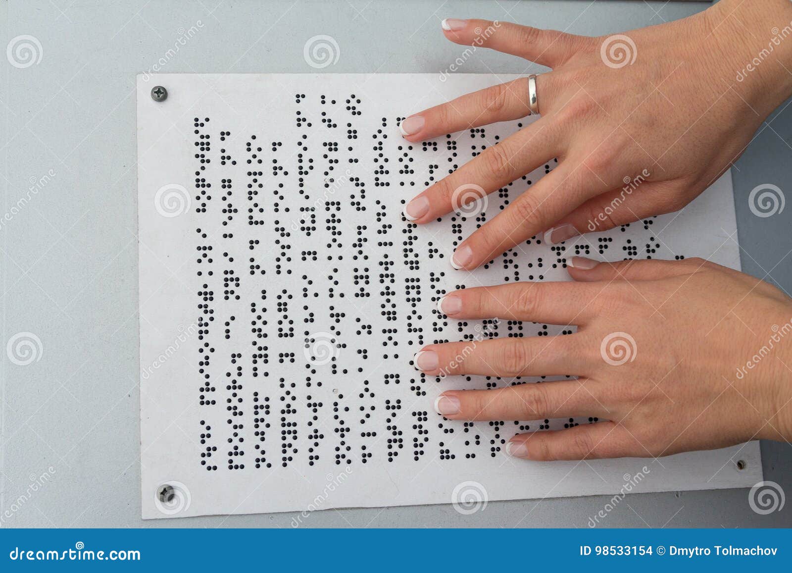 Hands of a Girl Reading a Text Written on Braille Stock Photo - Image ...
