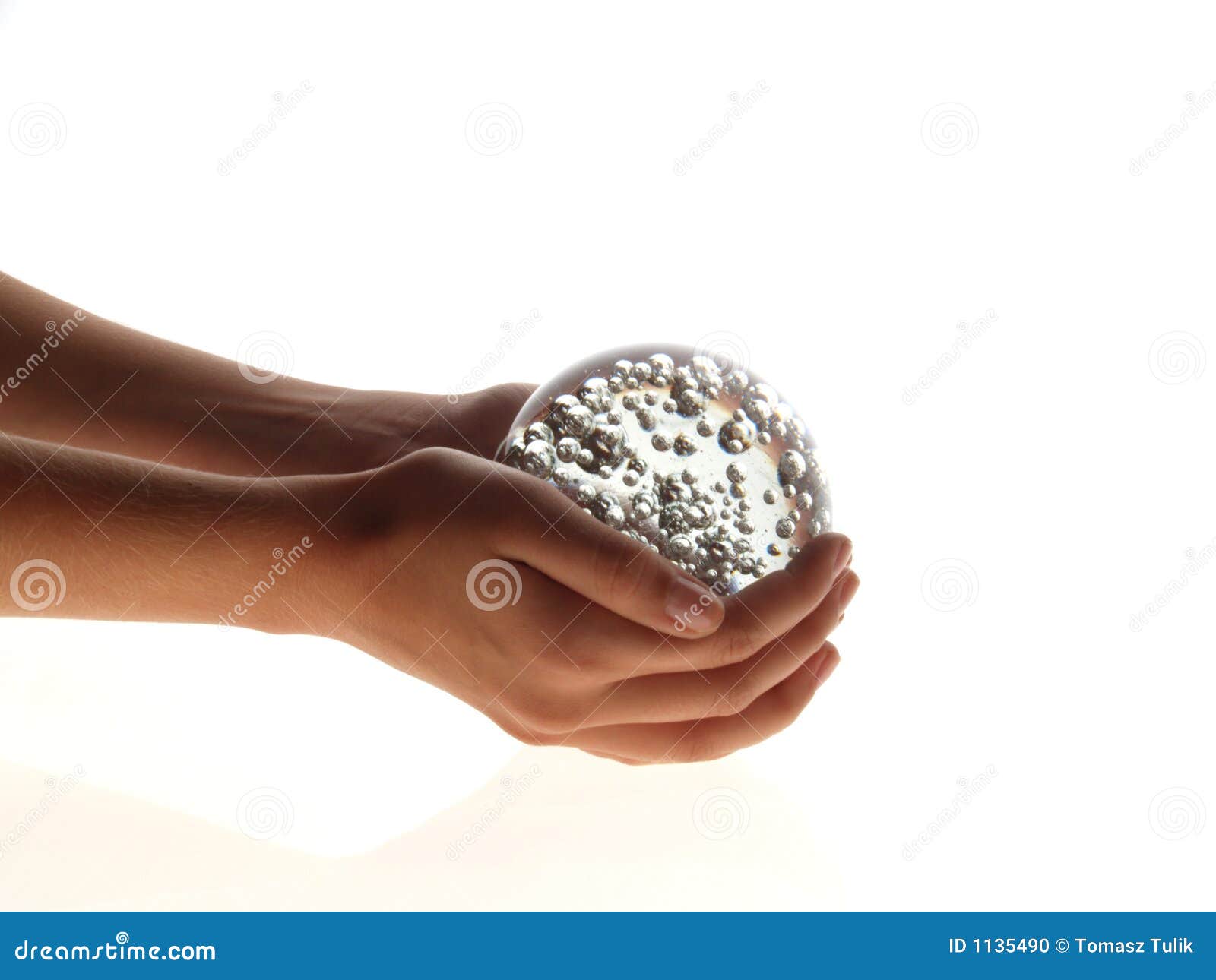 Hands and glass ball stock photo. Image of ball, hand - 1135490