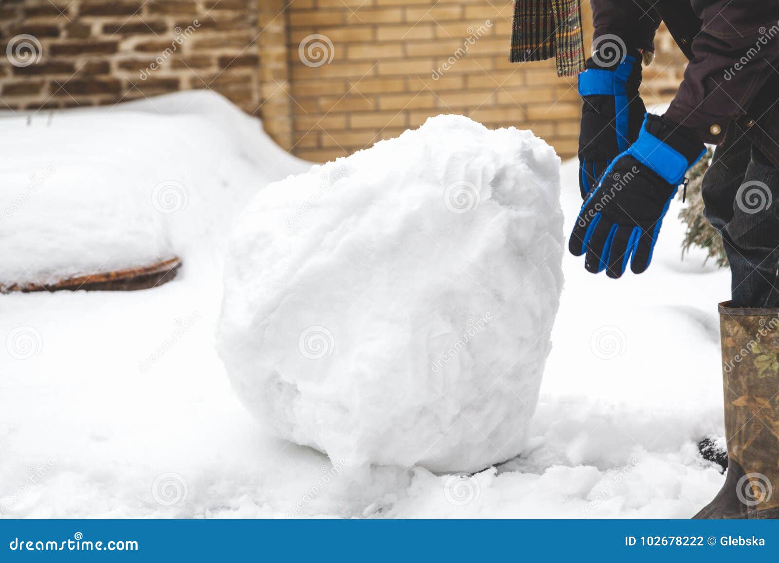 Hands in Gloves Rolled Snowball Stock Photo - Image of childhood ...