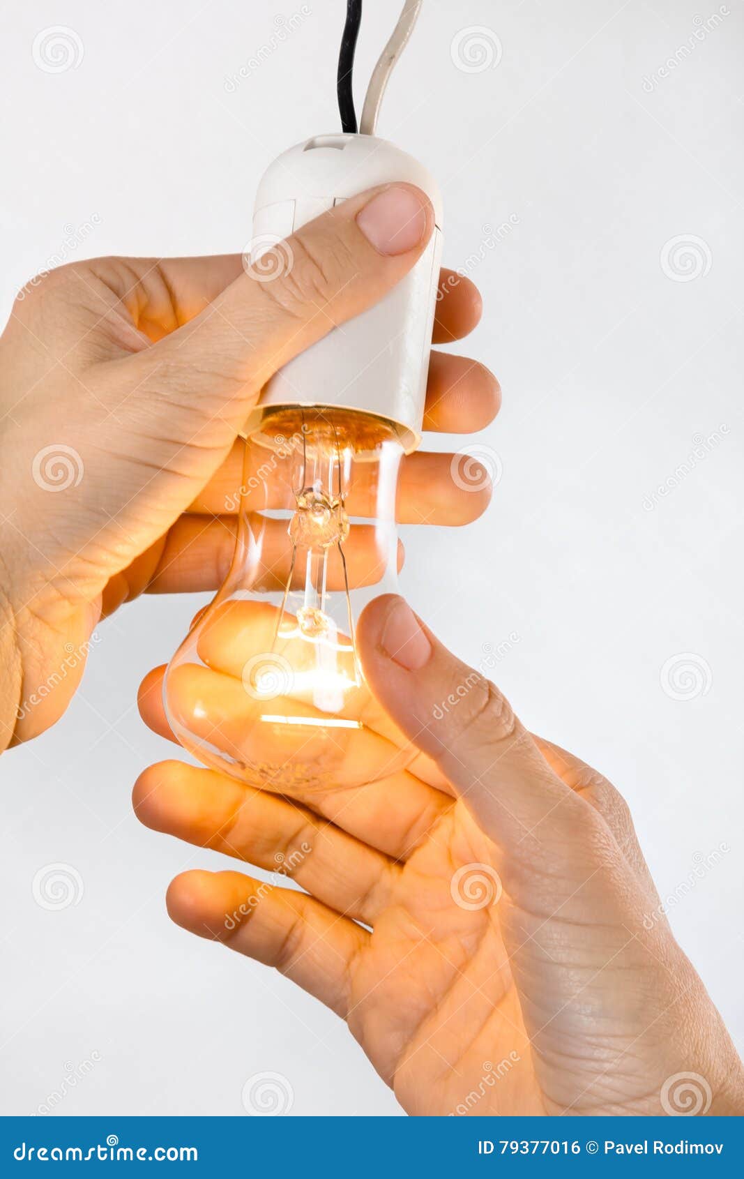 Hands with Glowing Incandescent Light Bulb Stock Photo - Image of ...